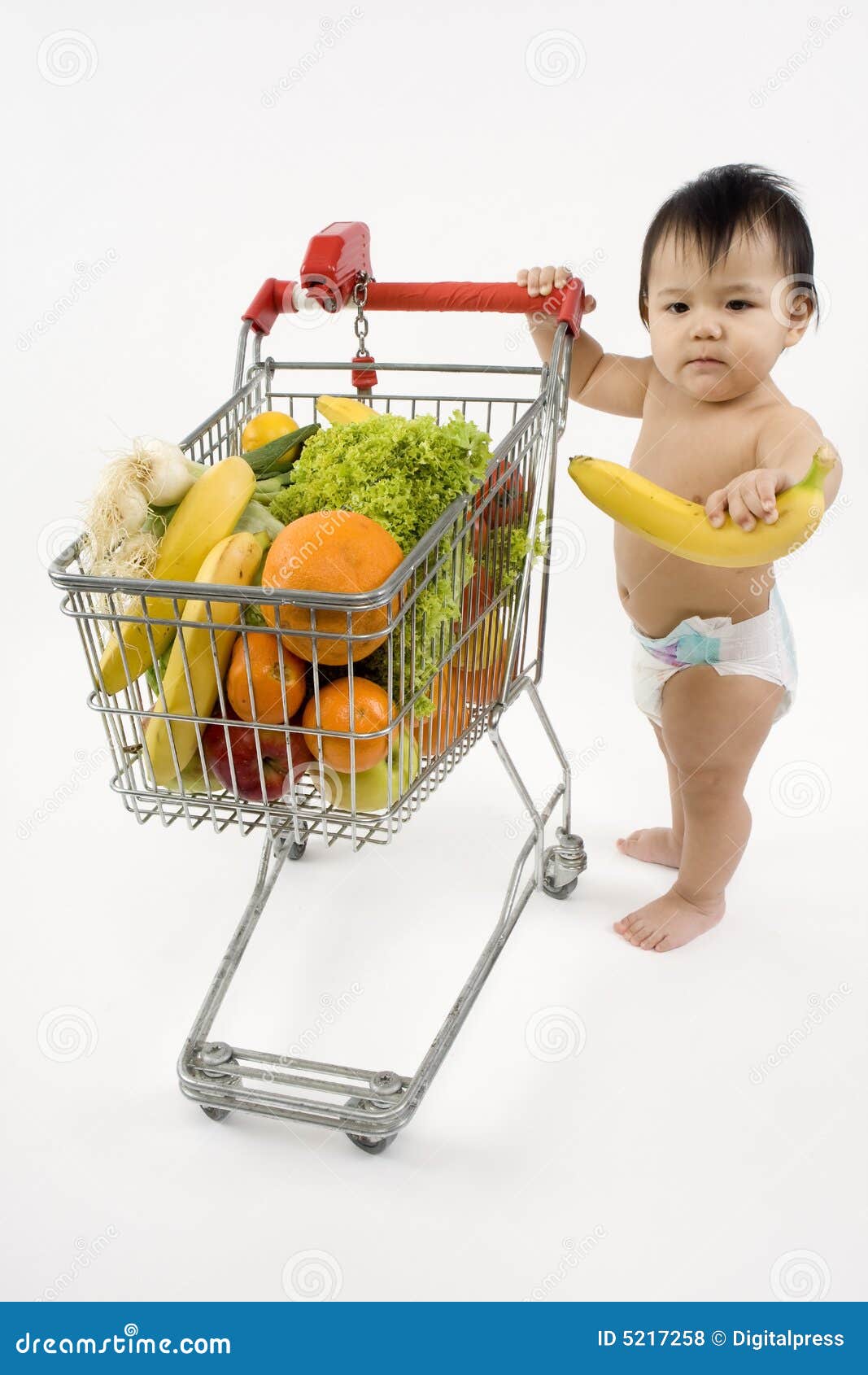 Baby Pushes A Shopping Cart Picture. Image: 5217258