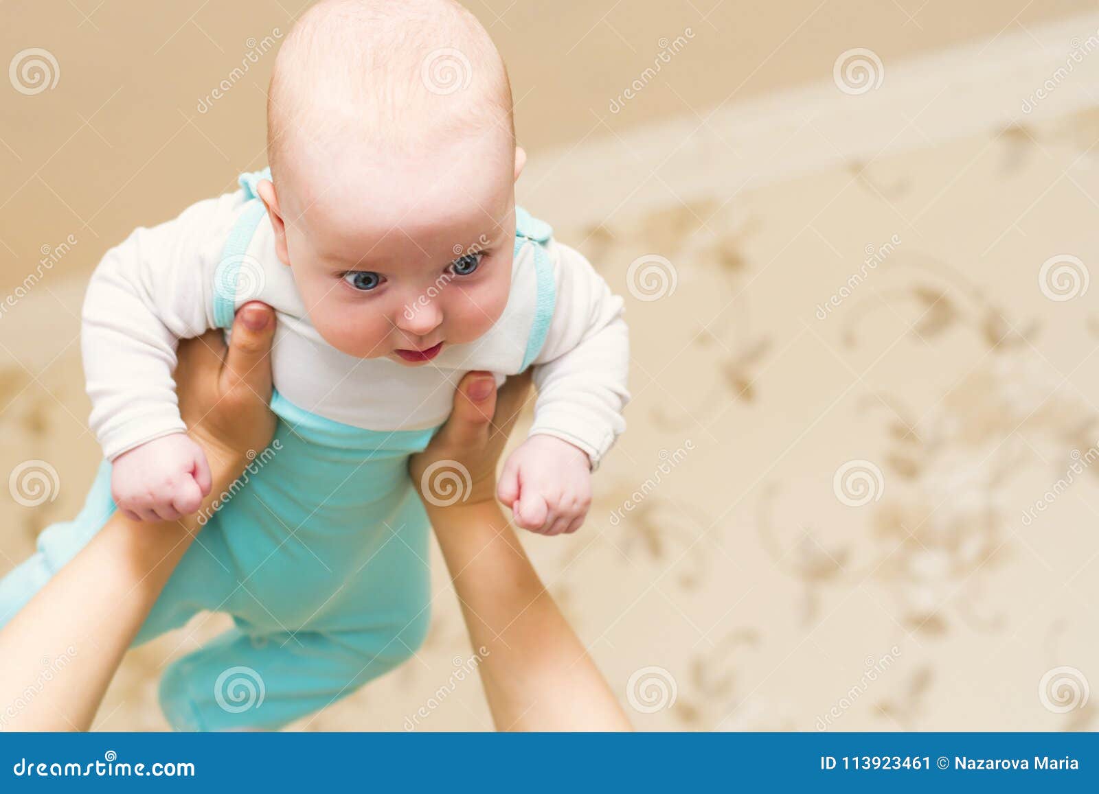 Baby raised up stock image. Image of parent, love, lovely - 113923461