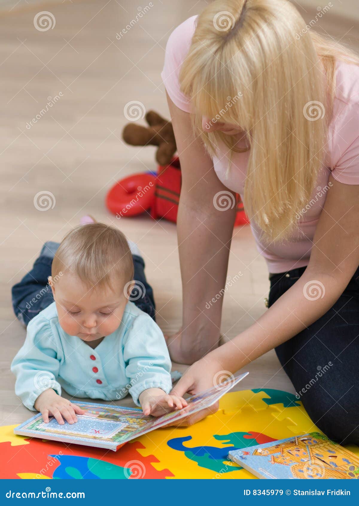 Baby reading stock image. Image of caucasian, listen, blonde - 8345979