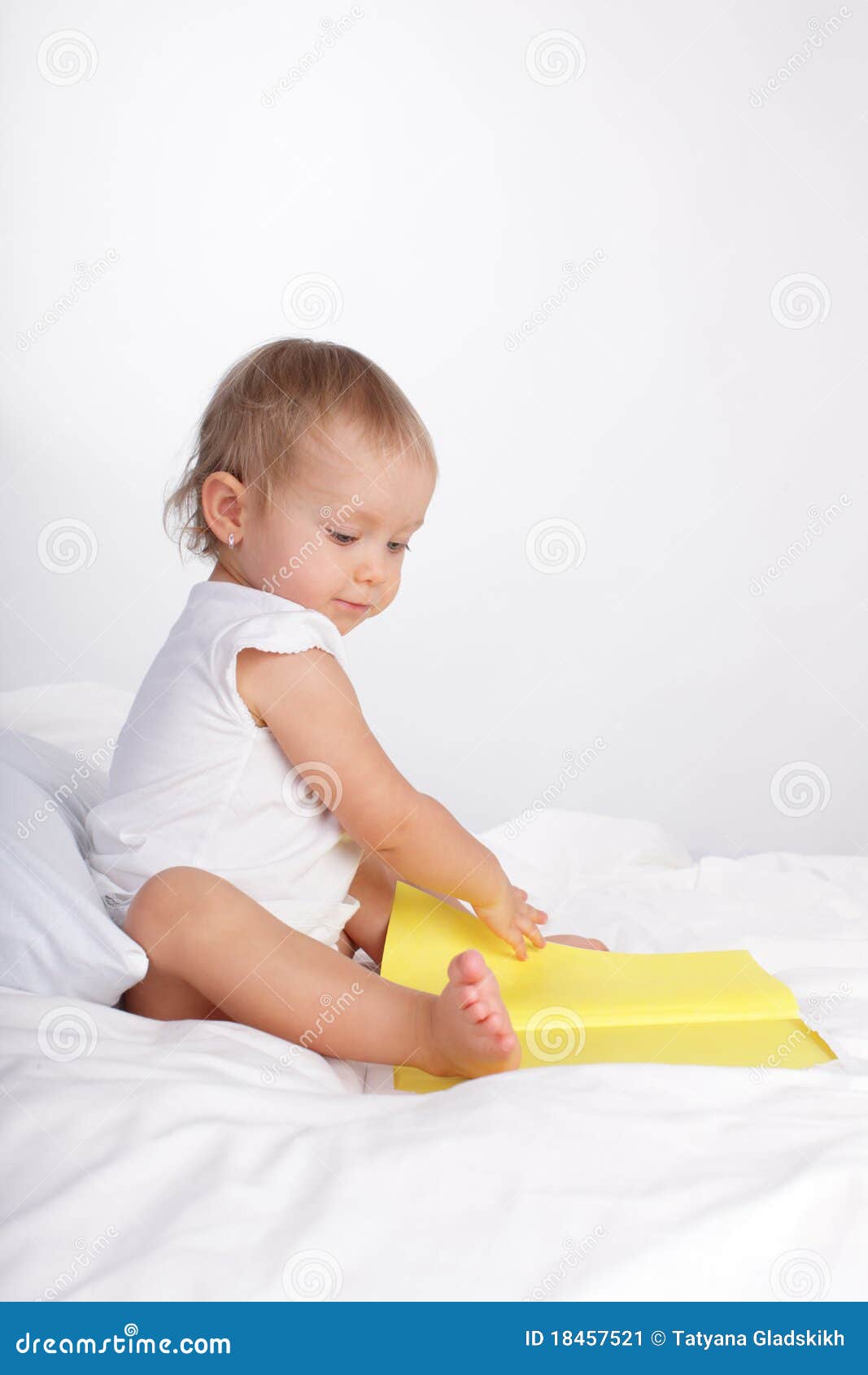 Baby reading book stock image. Image of home, girl, shot - 18457521