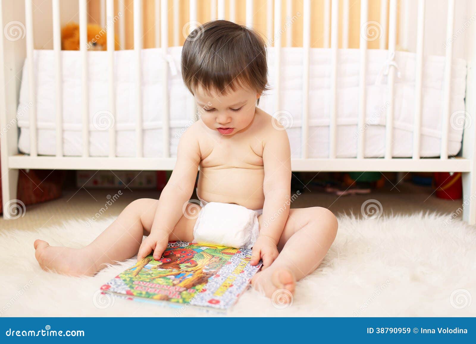 Baby reading book at home stock image. Image of fairy - 38790959