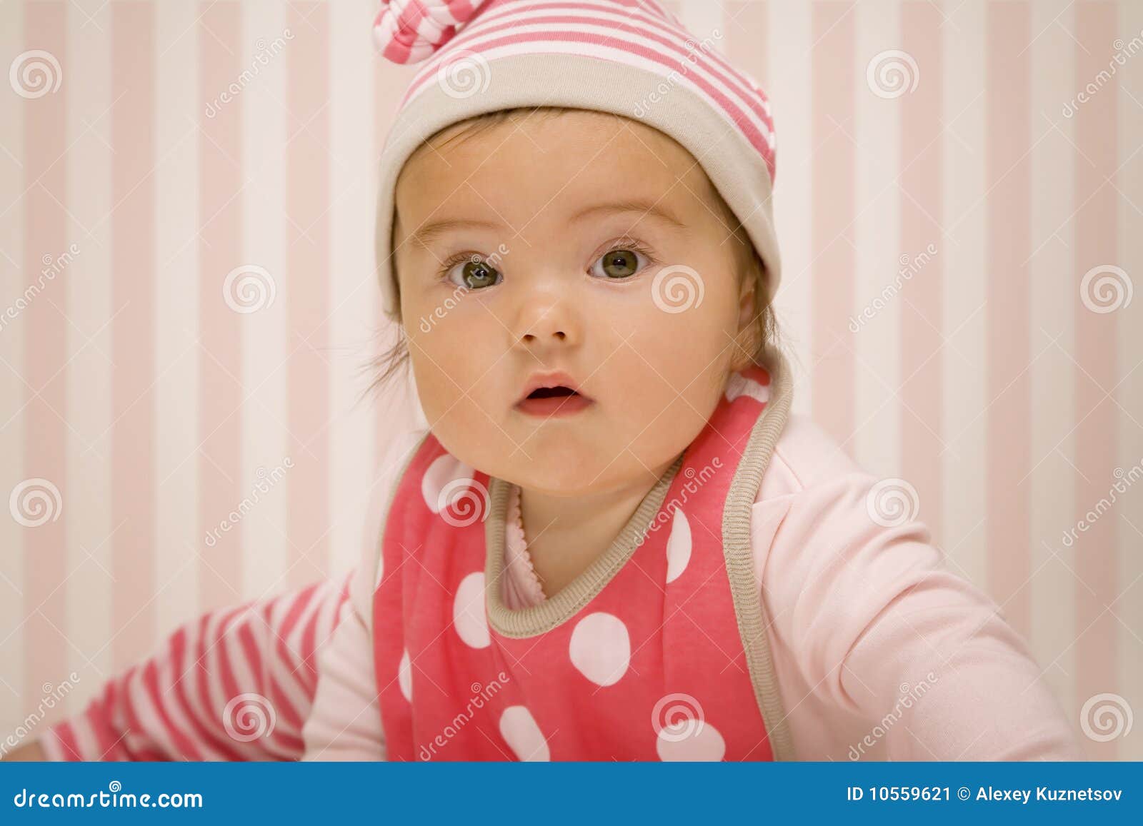 Baby in red stock image. Image of face, babies, newborn - 10559621
