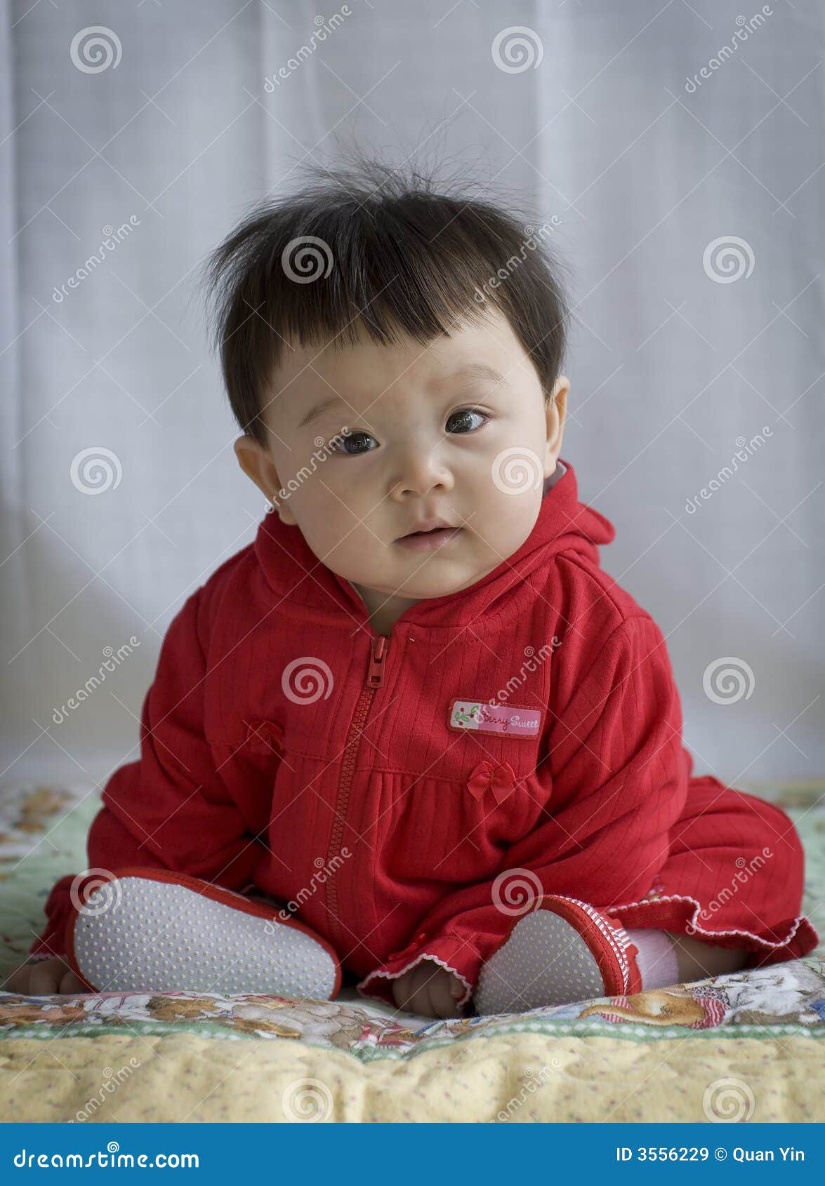 Baby in red stock image. Image of contact, daughter, family - 3556229