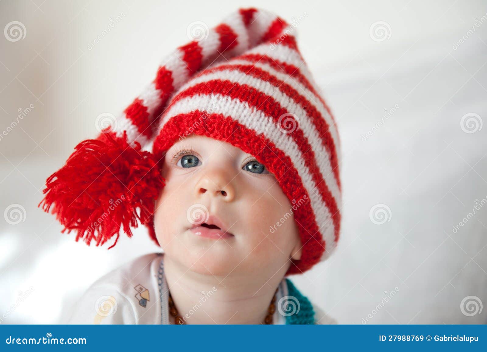 Baby with a red hat stock image. Image of expression - 27988769