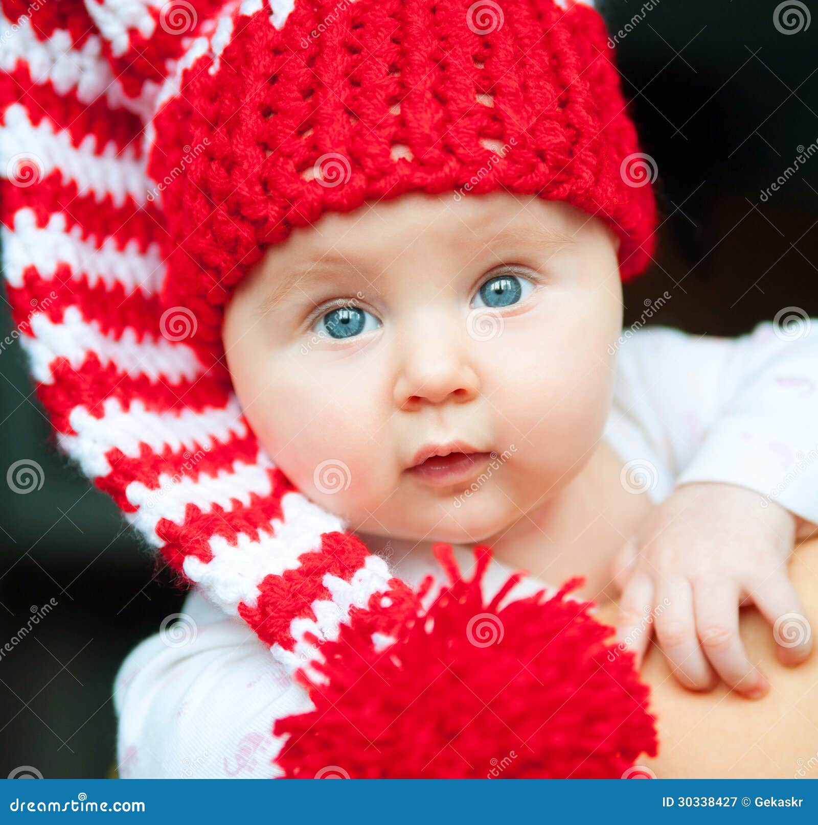 Baby in red hat stock image. Image of face, clothes, expression - 30338427