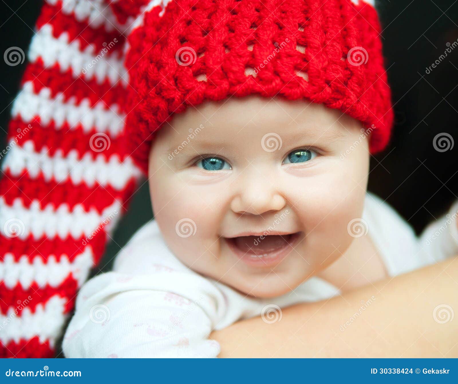Baby in red hat stock photo. Image of gentle, look, baby - 30338424
