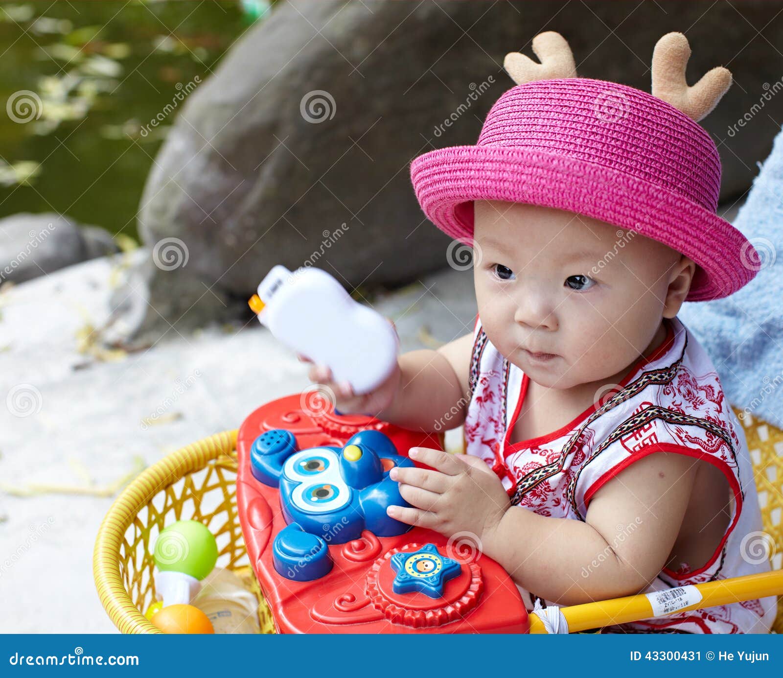 Baby in red hat stock image. Image of baby, play, asia - 43300431