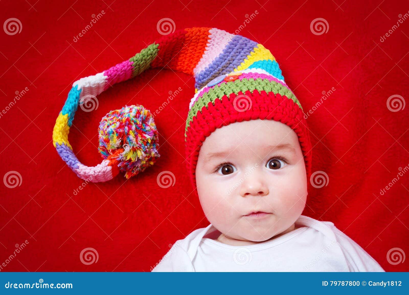 Baby in red and white hat stock photo. Image of happy - 79787800