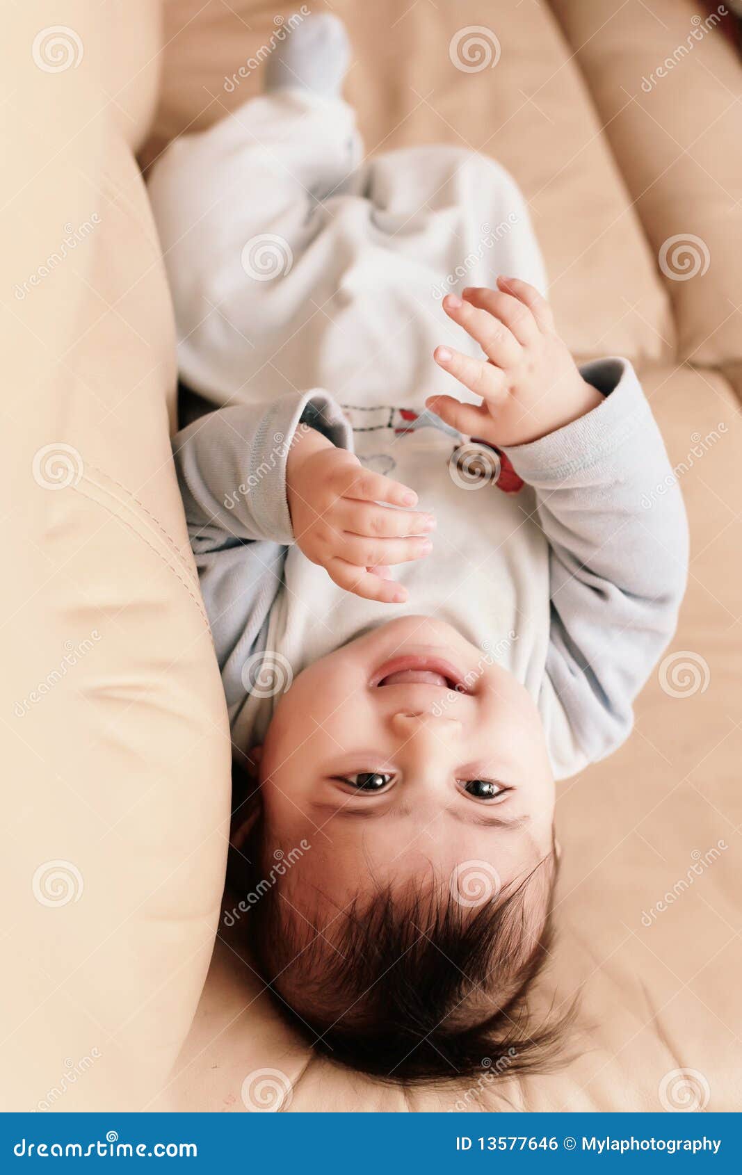 Baby relaxing stock photo. Image of baby, blurry, loveseat - 13577646