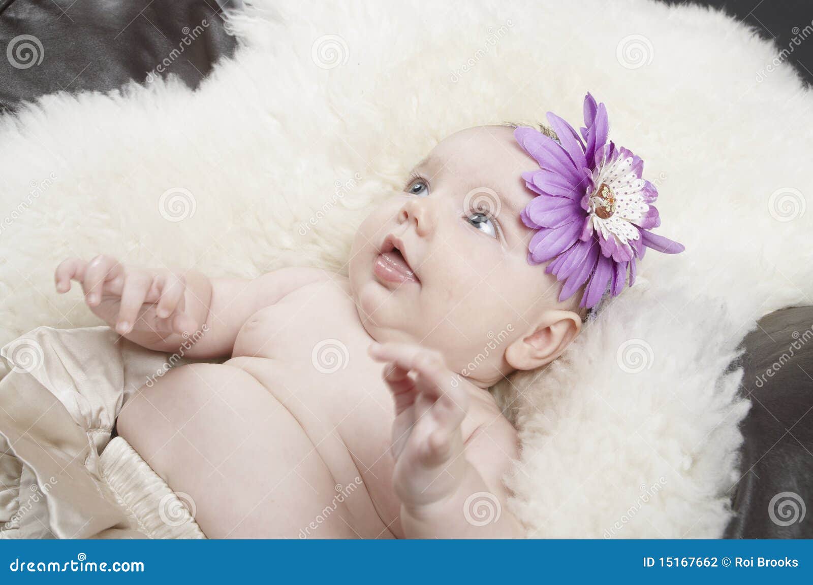 Baby on a rug stock photo. Image of stomach, skirt, sheepskin - 15167662