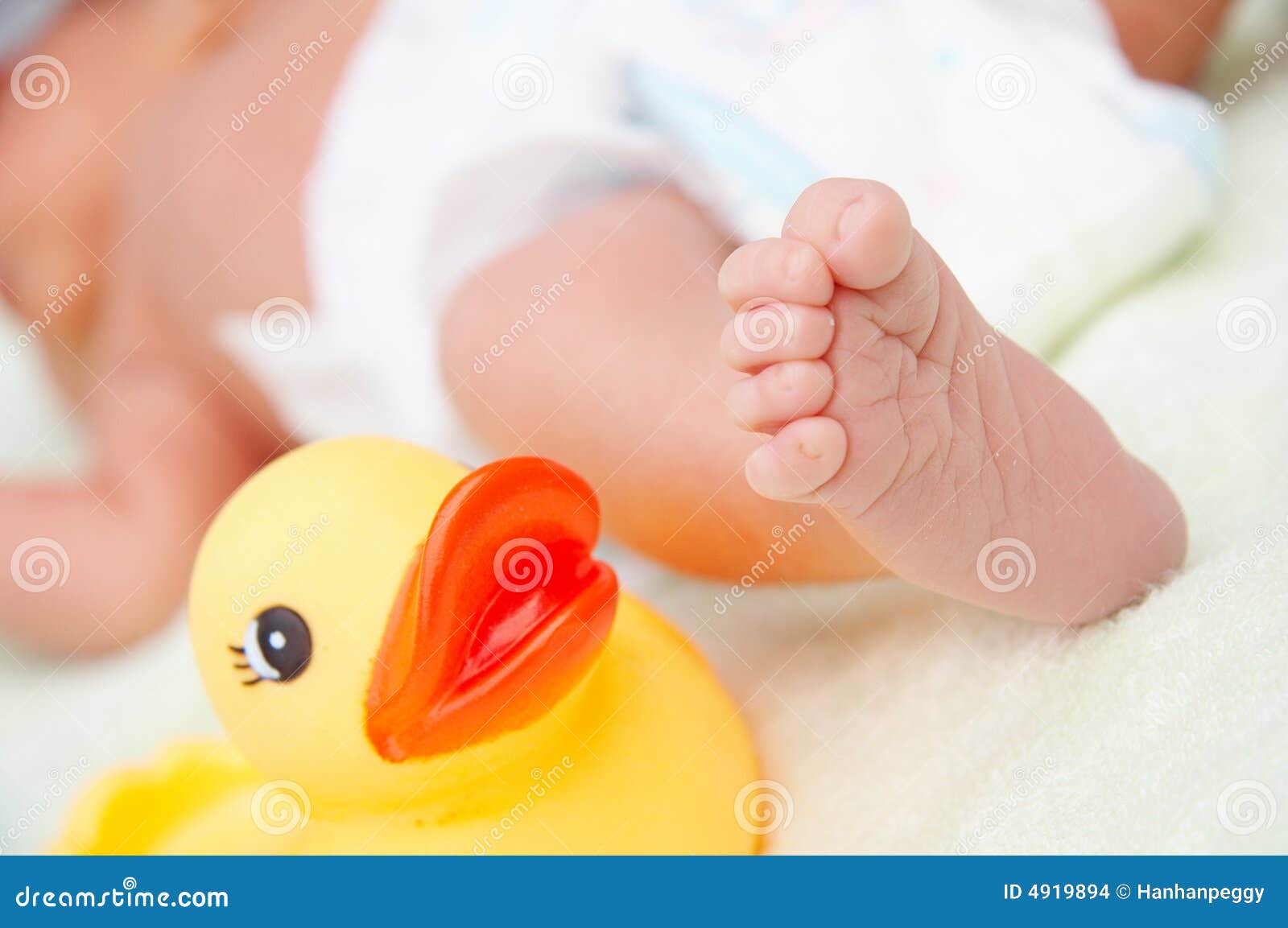 Baby s foot and toy stock photo. Image of child, beauty - 4919894