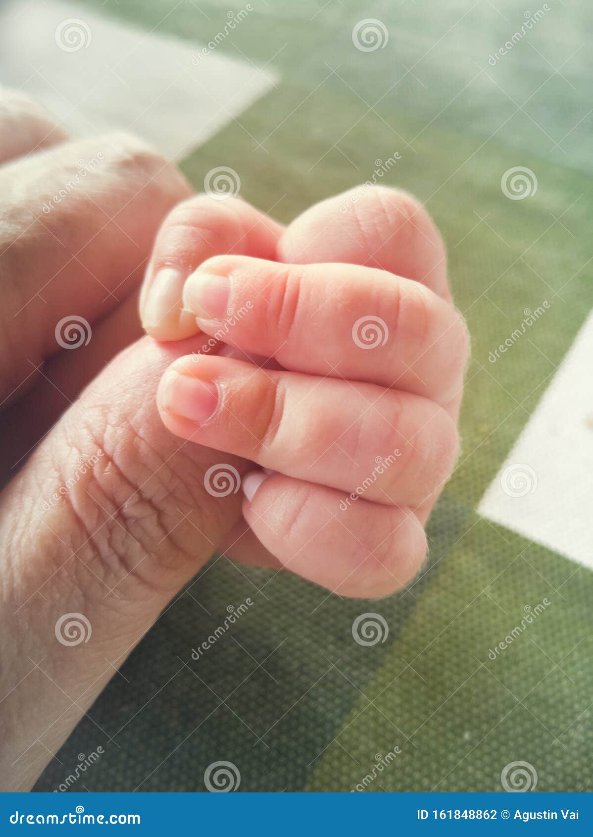 A BabyÂ´s Hand Catching a ManÂ´s Finger Stock Photo - Image of catch ...