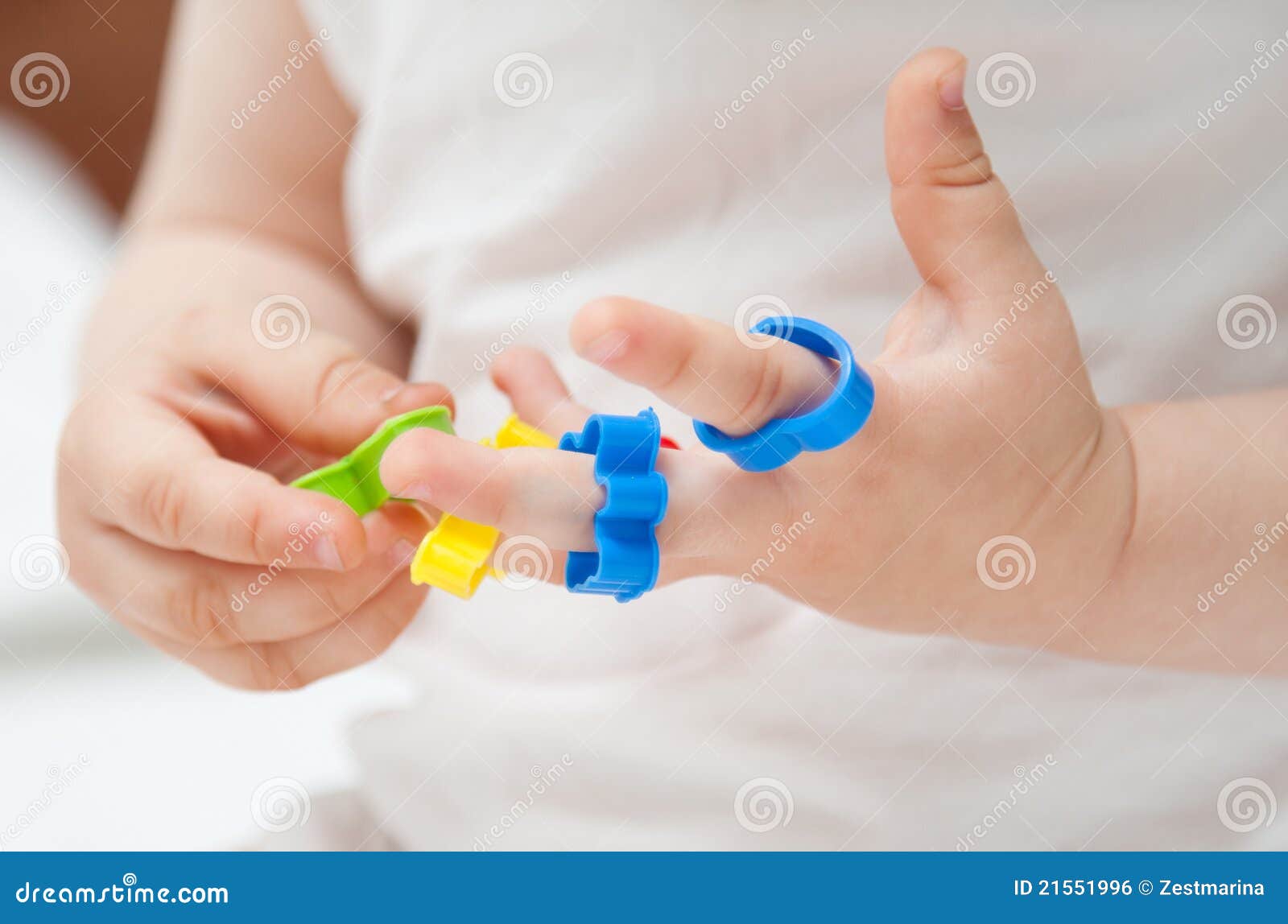 Baby s hands with toys stock photo. Image of development - 21551996