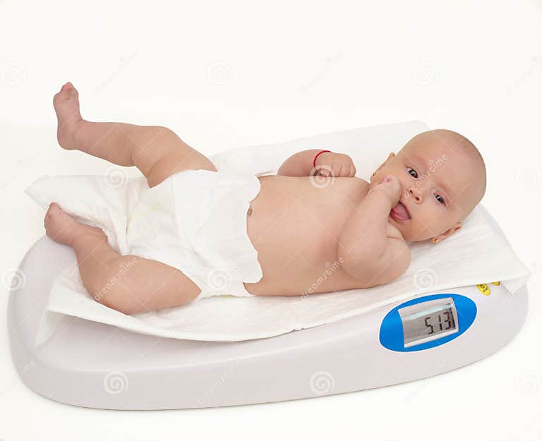 Baby on scale, isolated stock photo. Image of healthy - 55563000