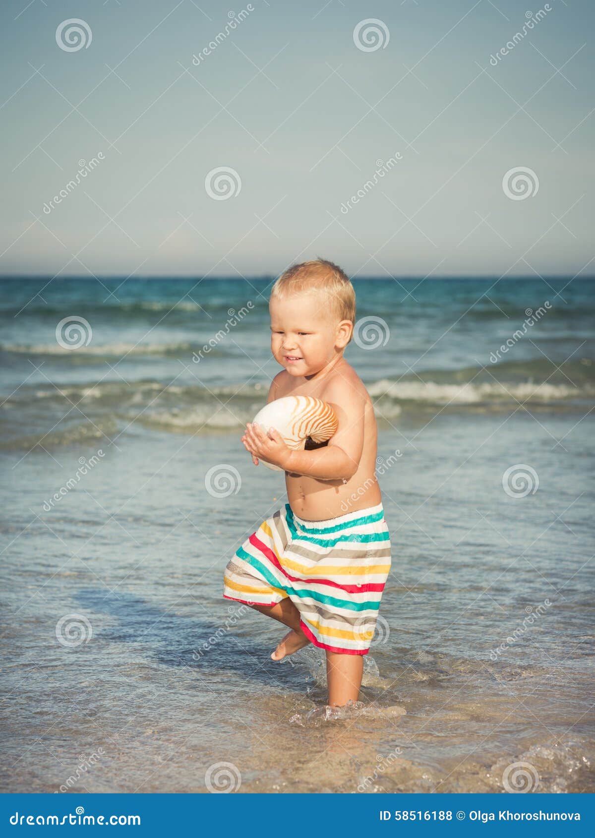 Baby in a sea stock photo. Image of learn, playful, leisure - 58516188