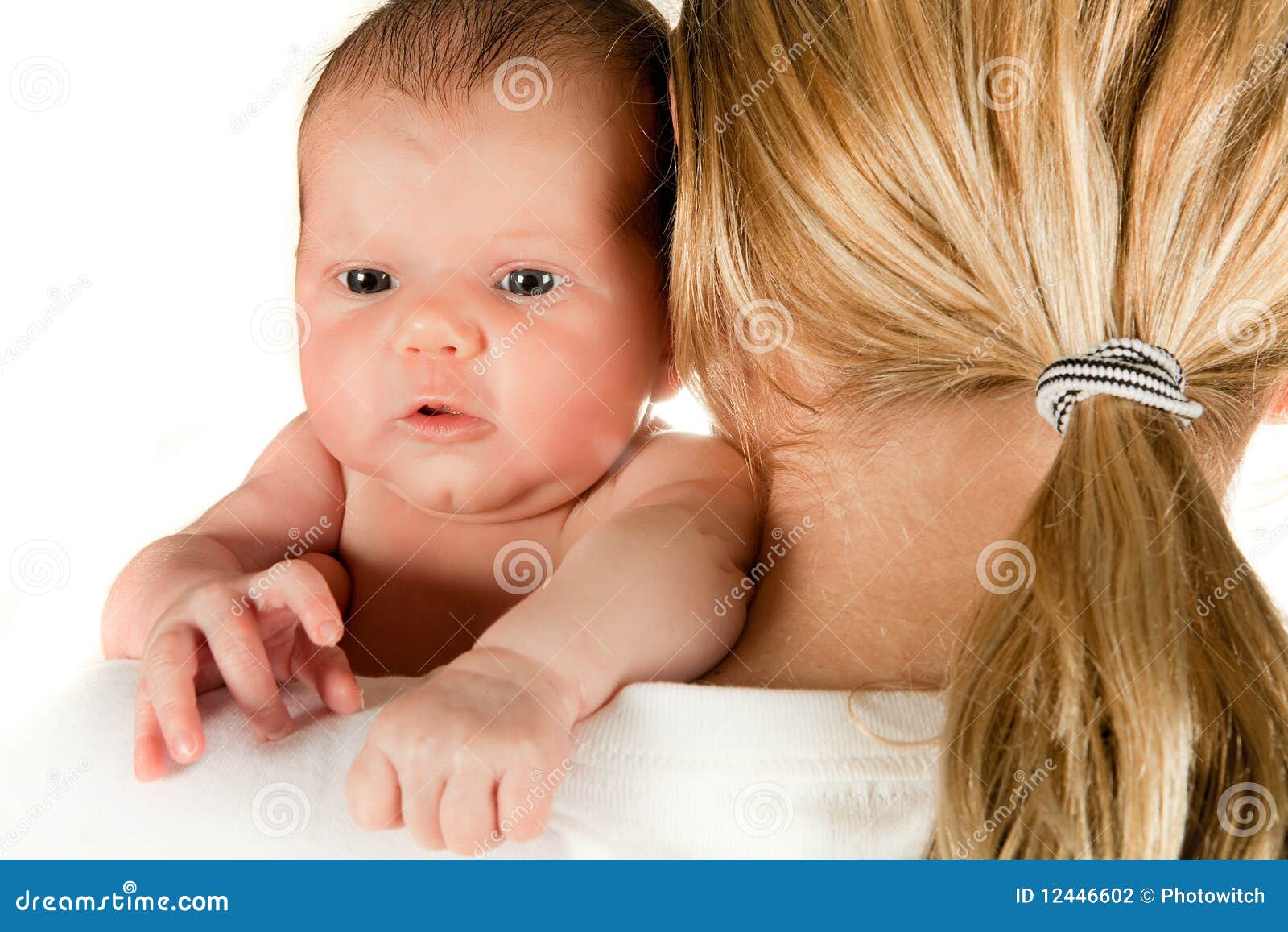 Baby secure with mother stock photo. Image of holding - 12446602