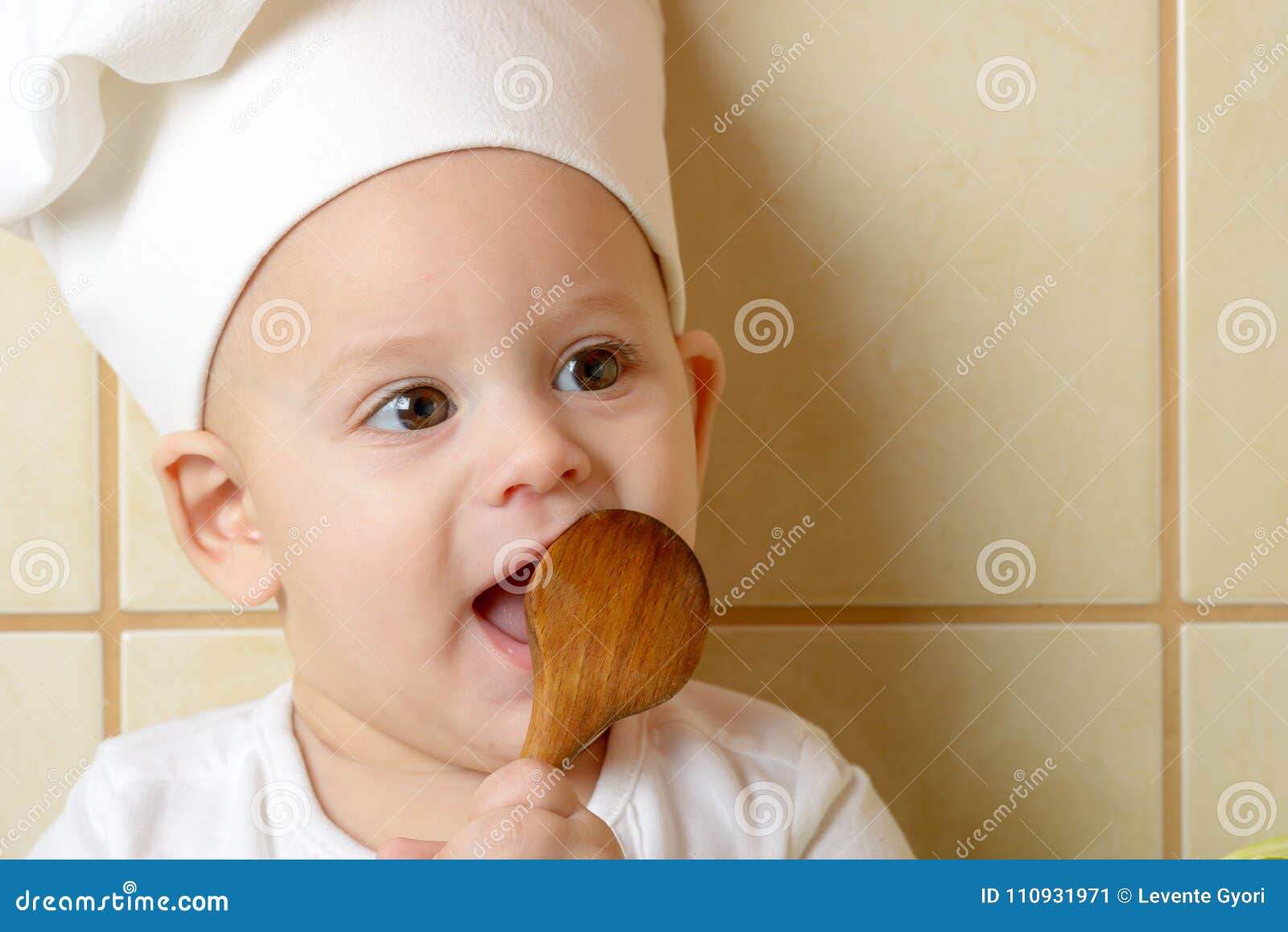 Baby shef in the kitchen stock image. Image of happiness - 110931971
