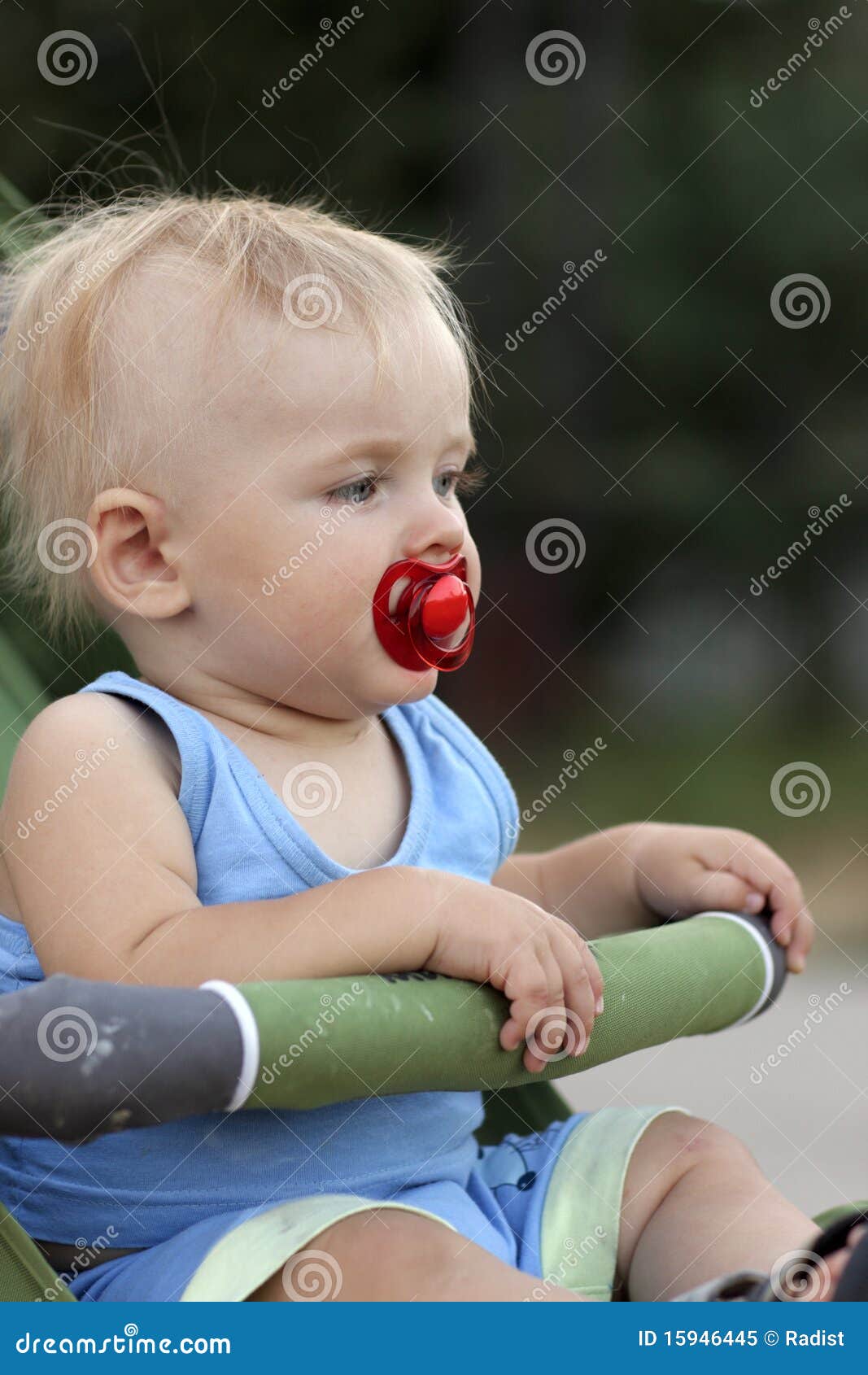 Baby sits in perambulator stock image. Image of contemporary - 15946445