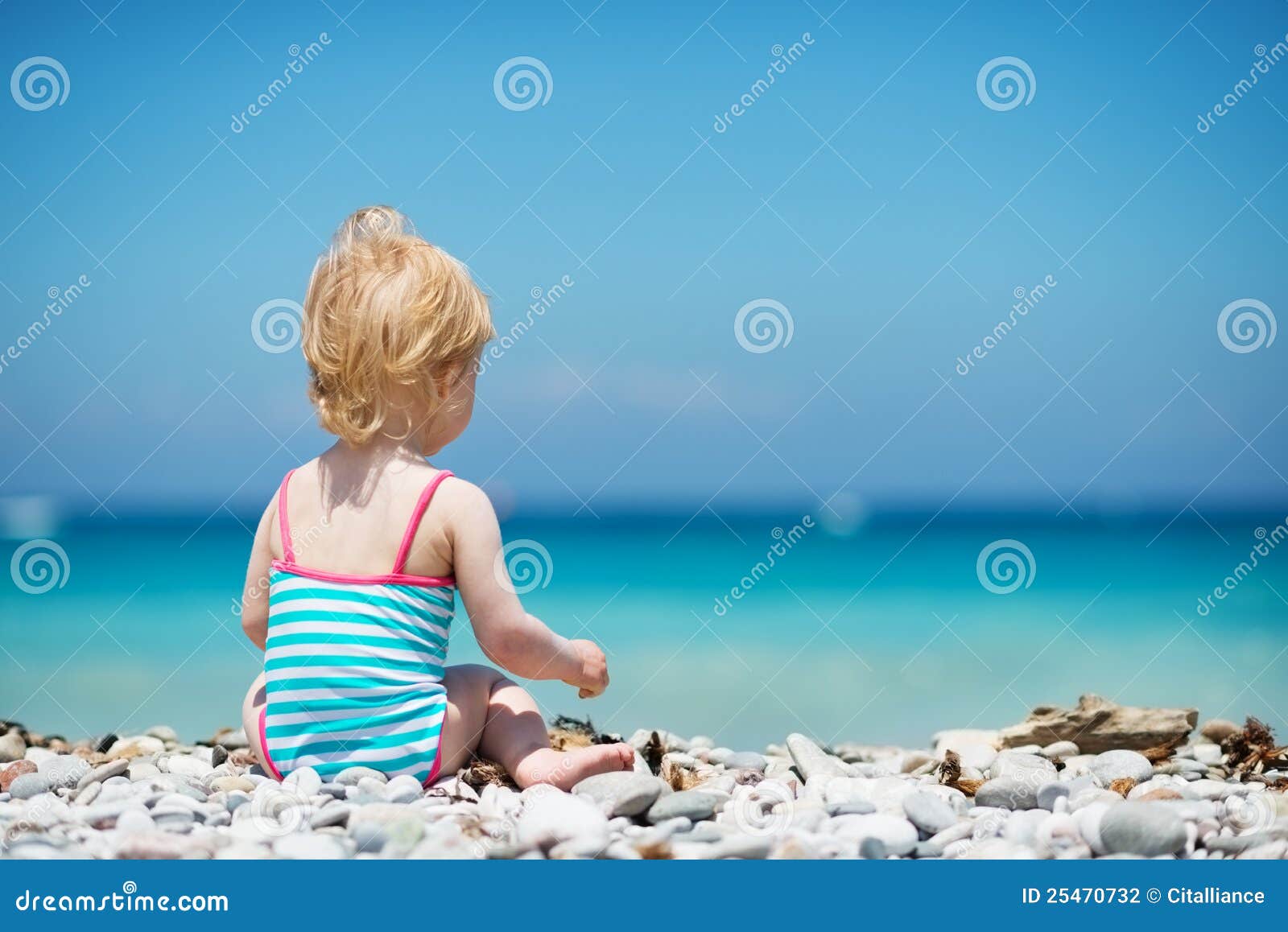 Baby Sitting on Beach. Rear View Stock Photo - Image of rest, life ...