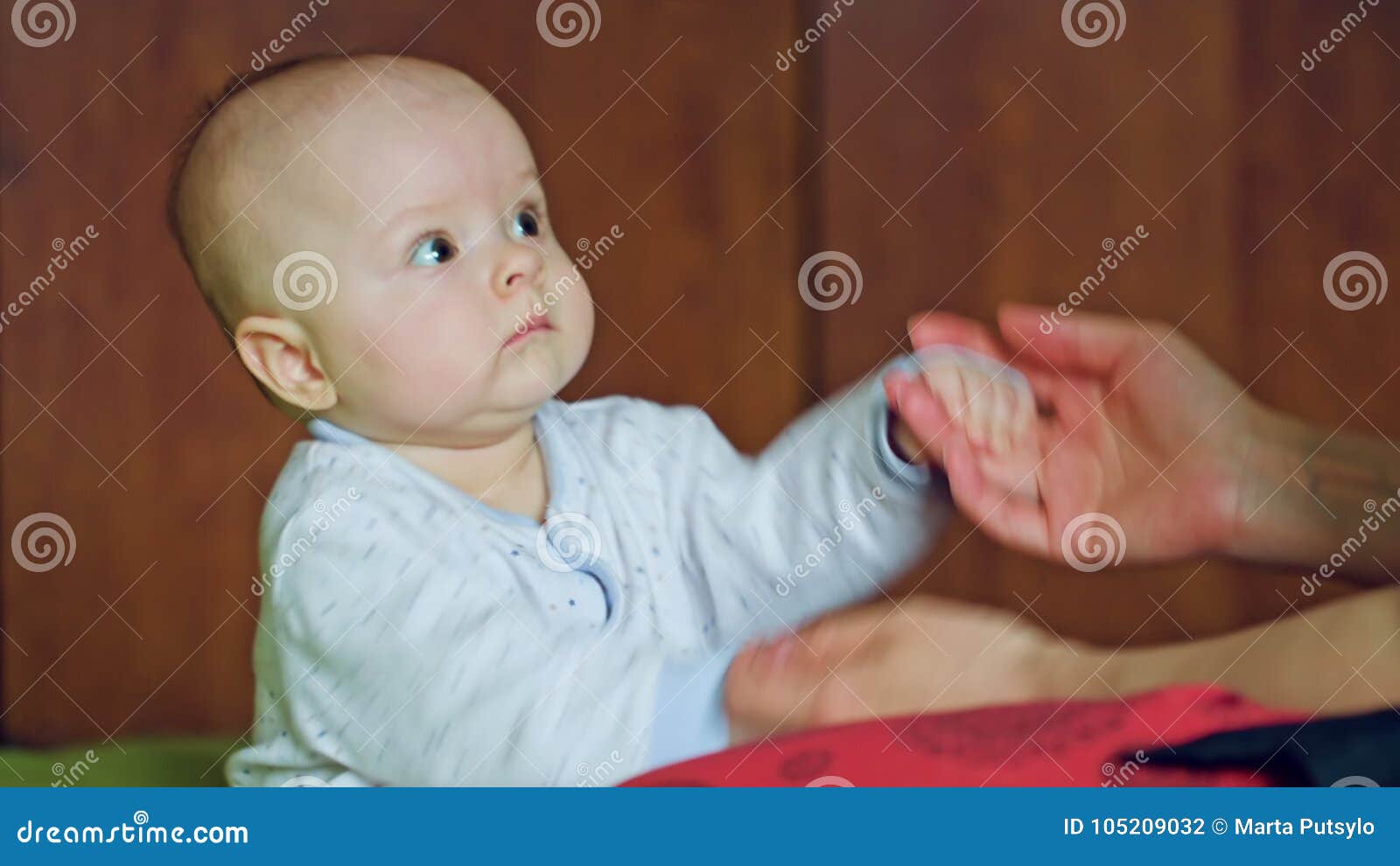 Baby Sitting Being Supported by Her Mother Stock Photo - Image of ...