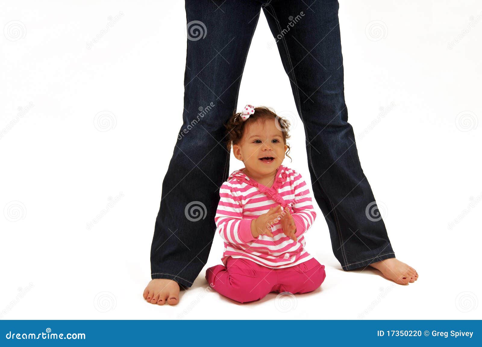 Baby Sitting Beneath Mommy S Legs Stock Photo - Image of baby, mother ...