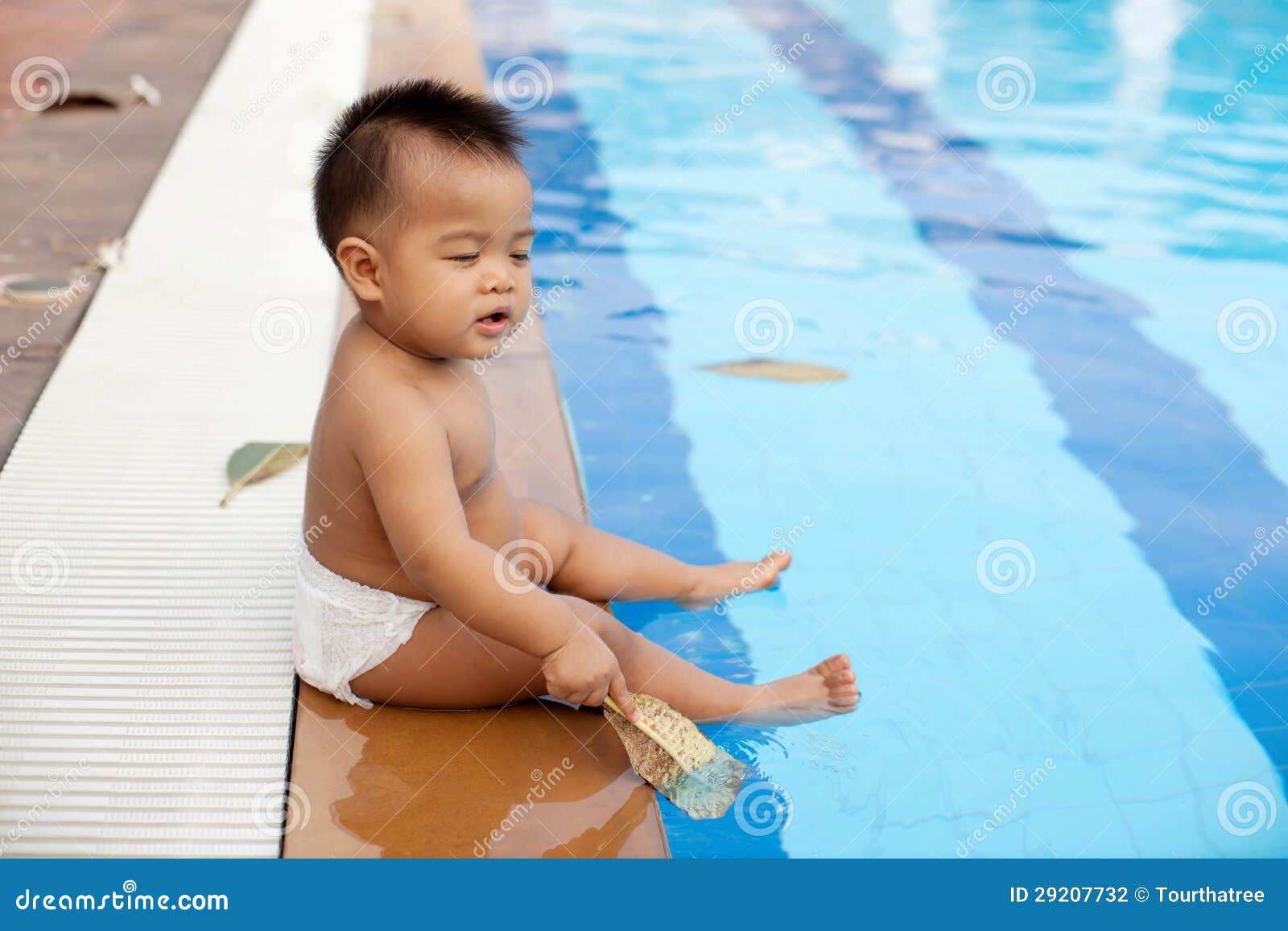 Baby Sitting Side of the Pool Stock Photo - Image of white, beautiful ...