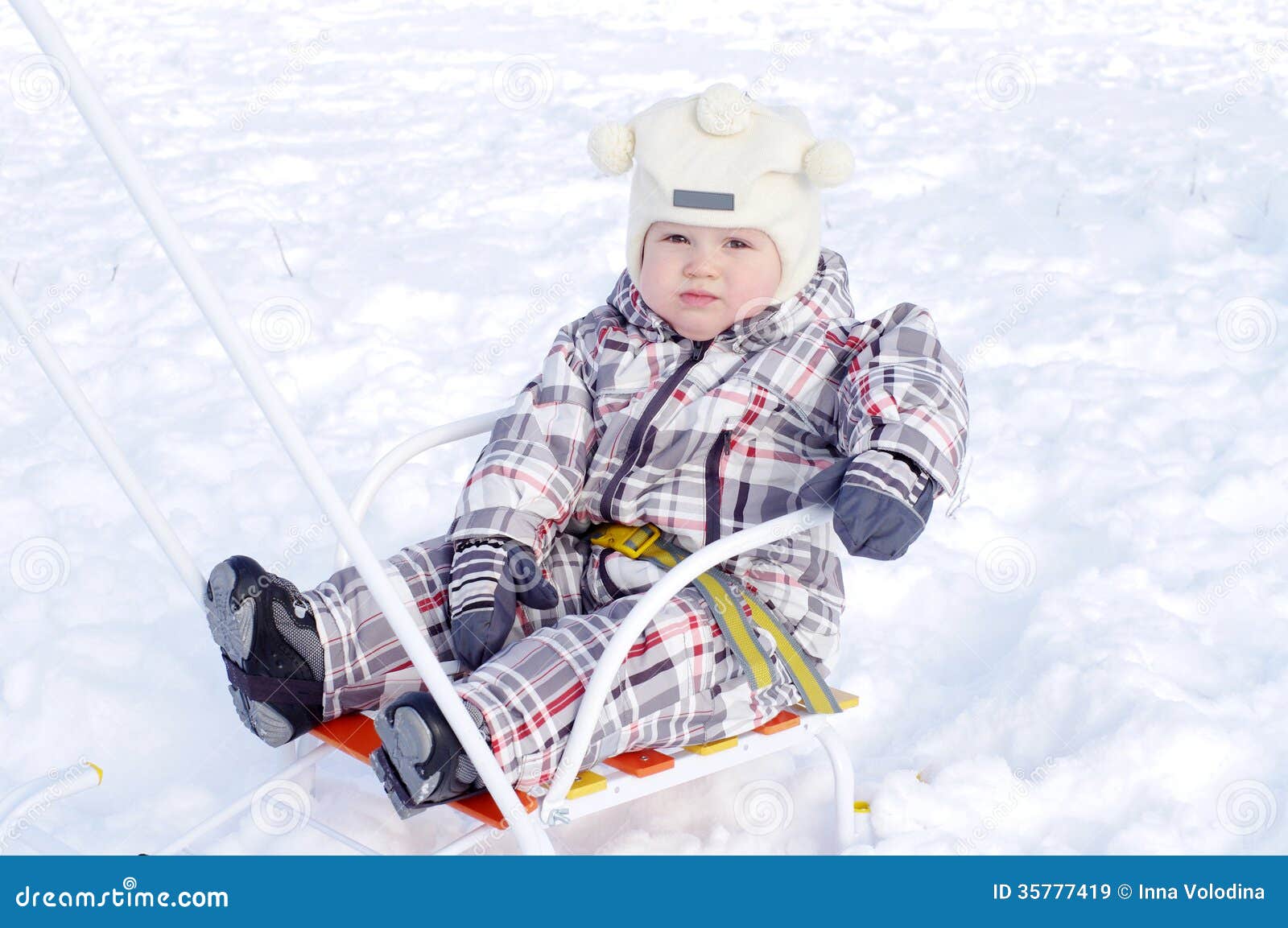 Baby sitting on sledge stock image. Image of nature, cute - 35777419