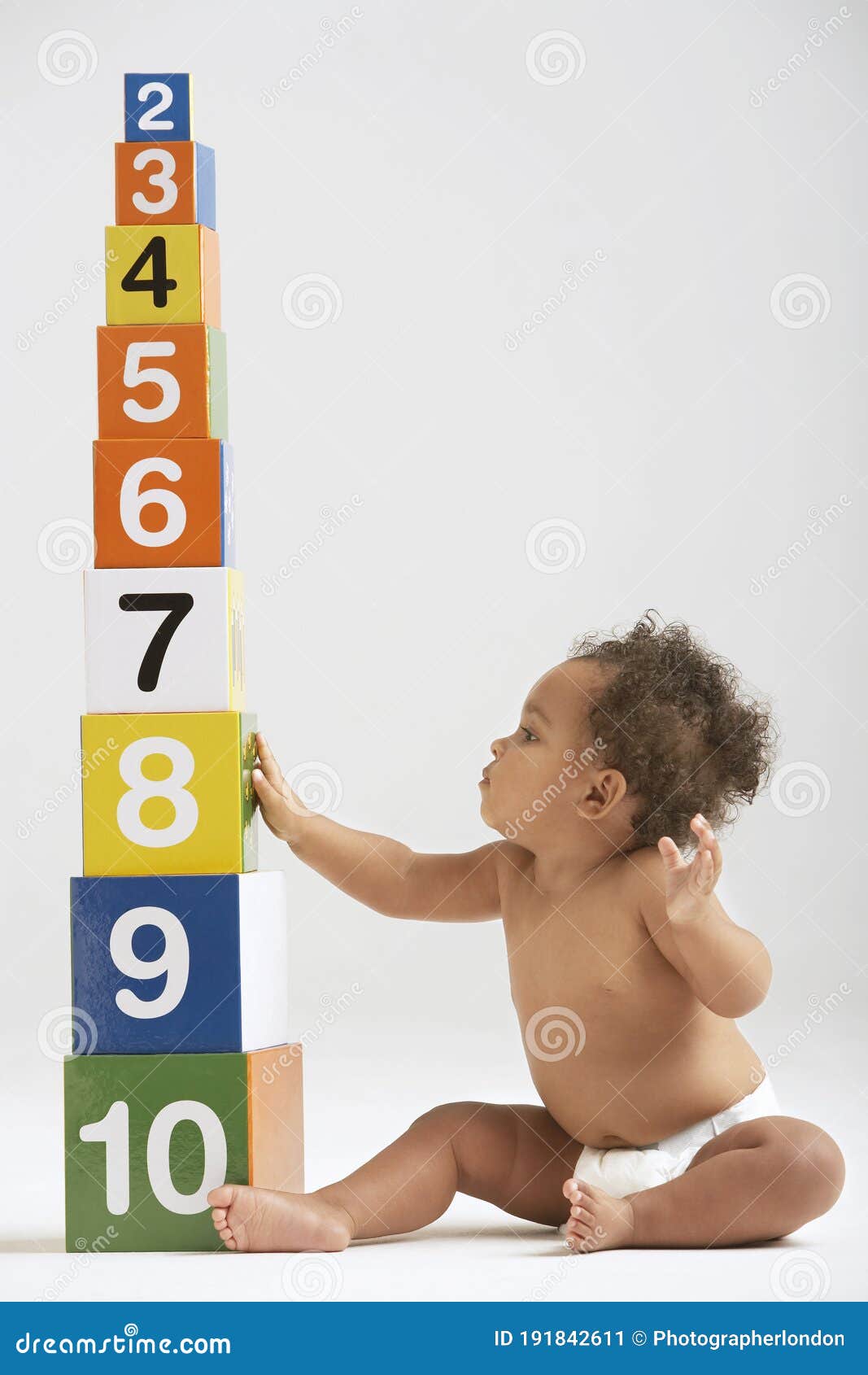 Baby Sitting by Tower of Number Blocks Stock Image - Image of ethnicity ...