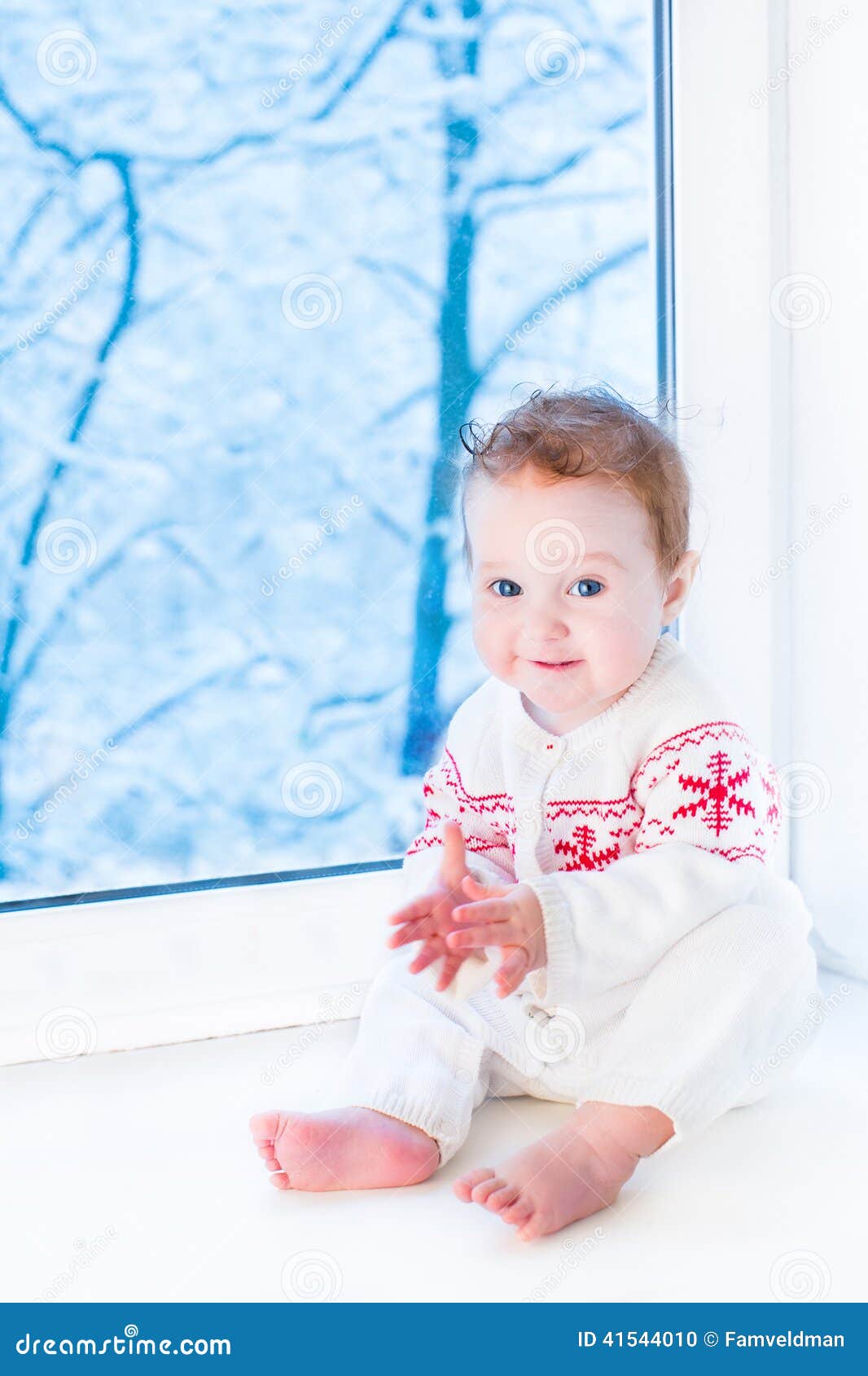 Baby Sitting at Window Watching Snow Covered Trees Stock Photo - Image ...