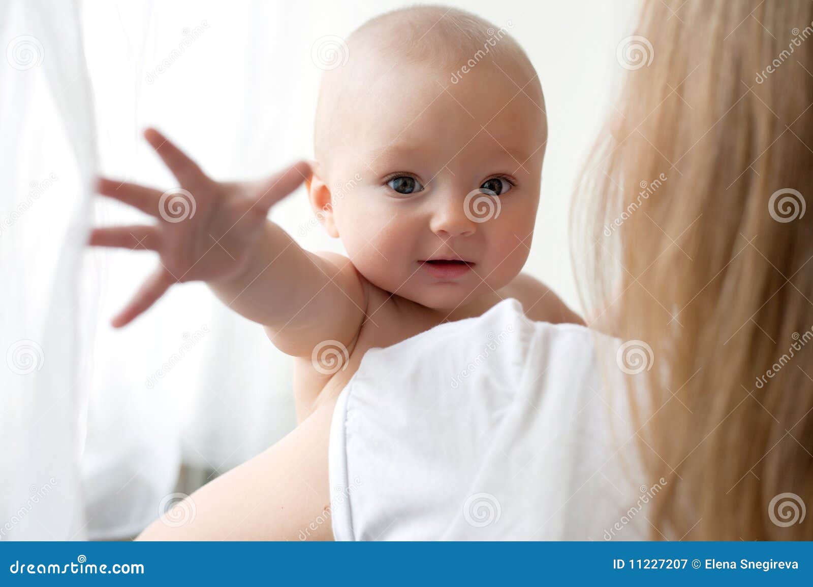 Baby of Six Months Old in His Mothers Hands. Stock Image - Image of ...
