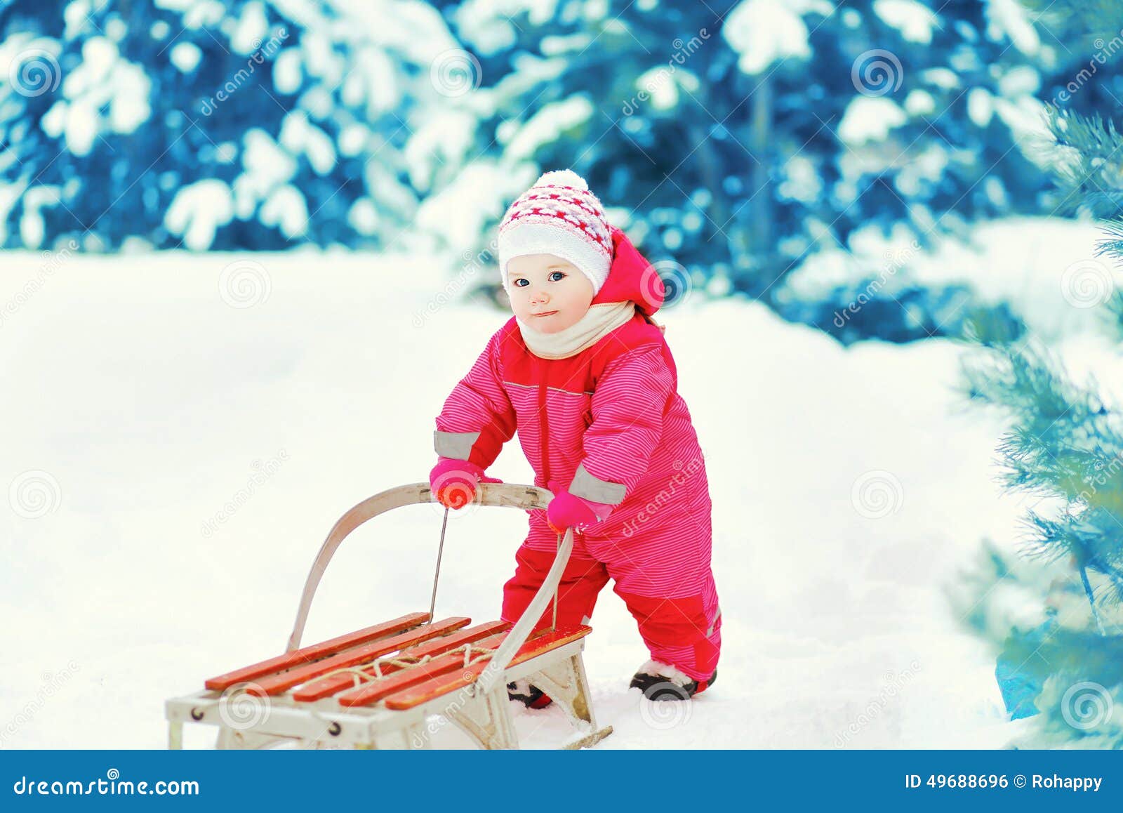 Baby Sledding in the Winter Stock Photo - Image of outdoors, forest ...