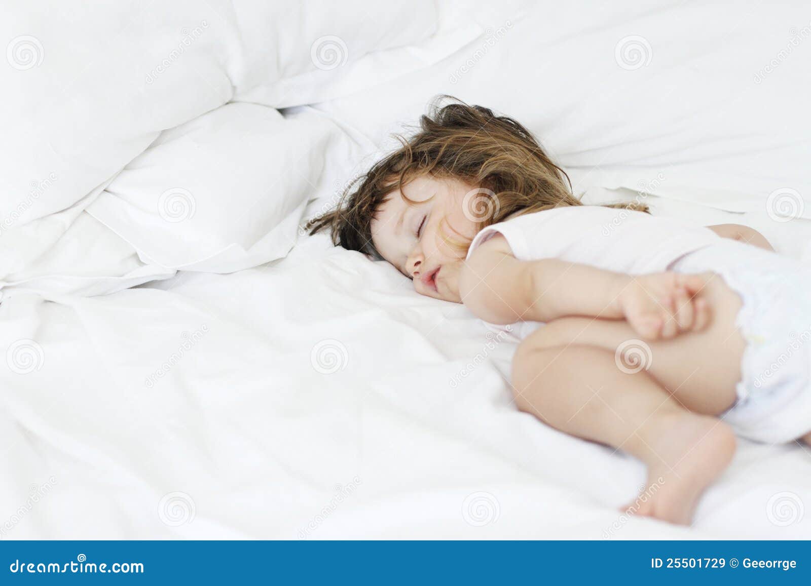 Baby Sleeping Peacefully in a White Bed Stock Image - Image of linen ...