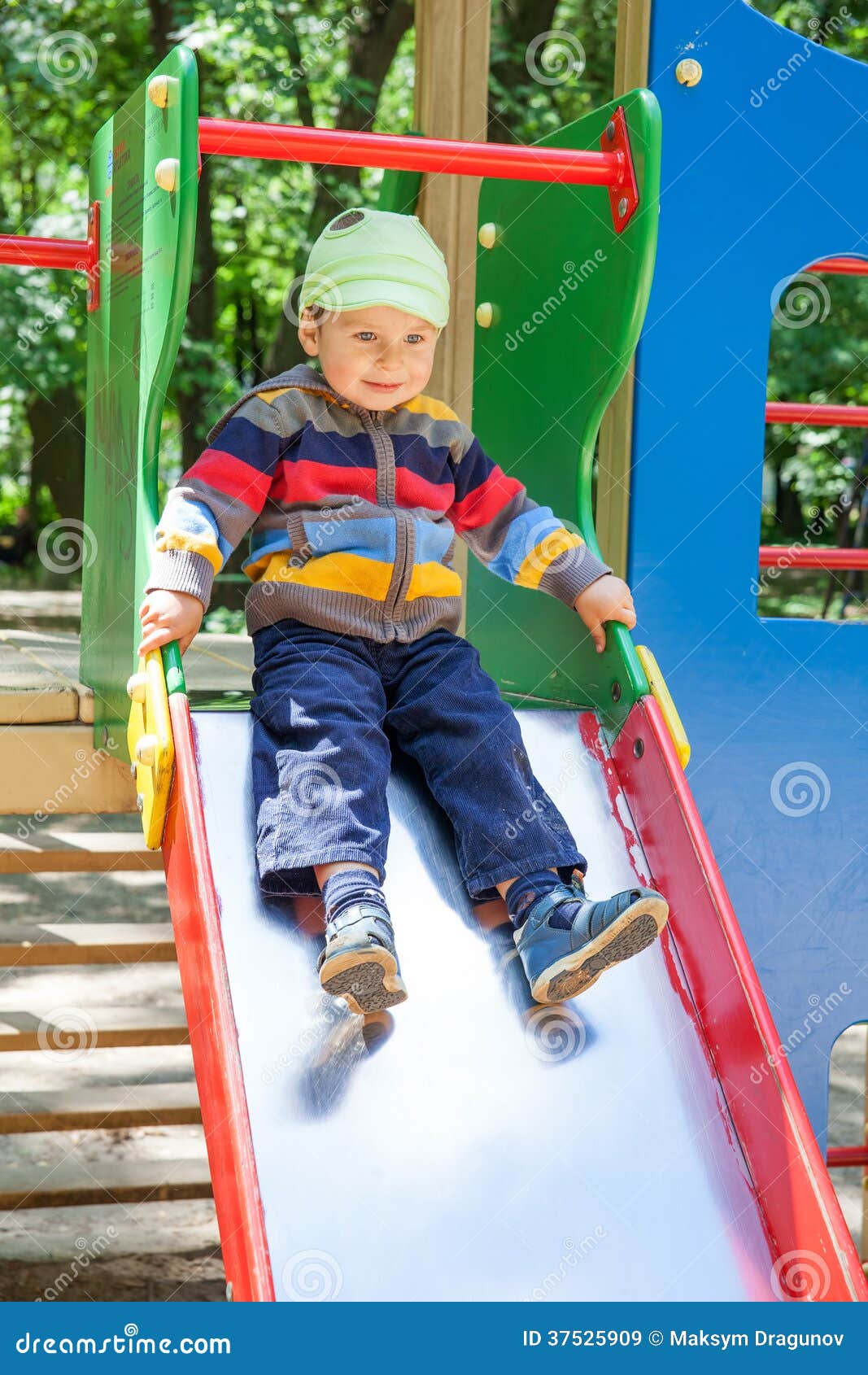 Baby on the slide stock image. Image of portrait, little - 37525909