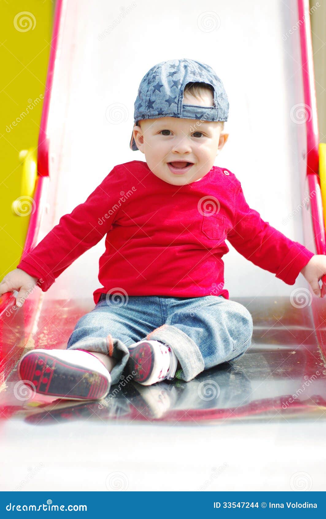 Baby on slide stock photo. Image of rejoice, european - 33547244