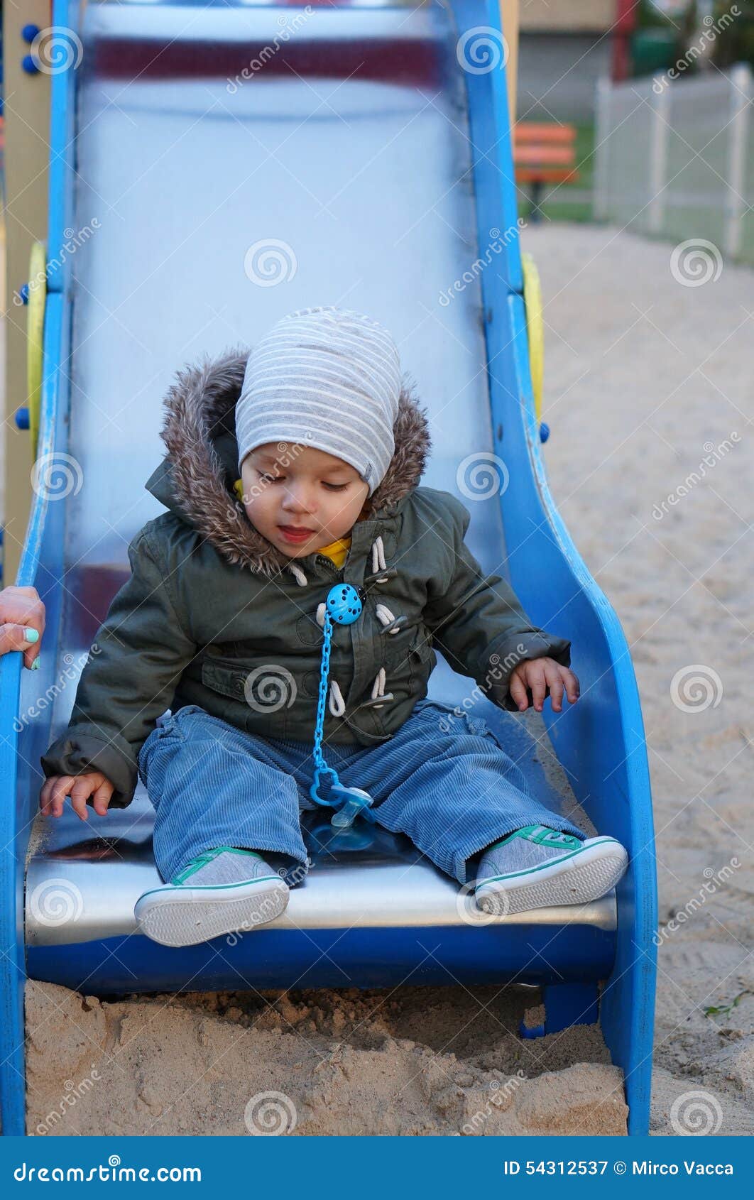 Baby on slide stock image. Image of play, sand, sitting - 54312537