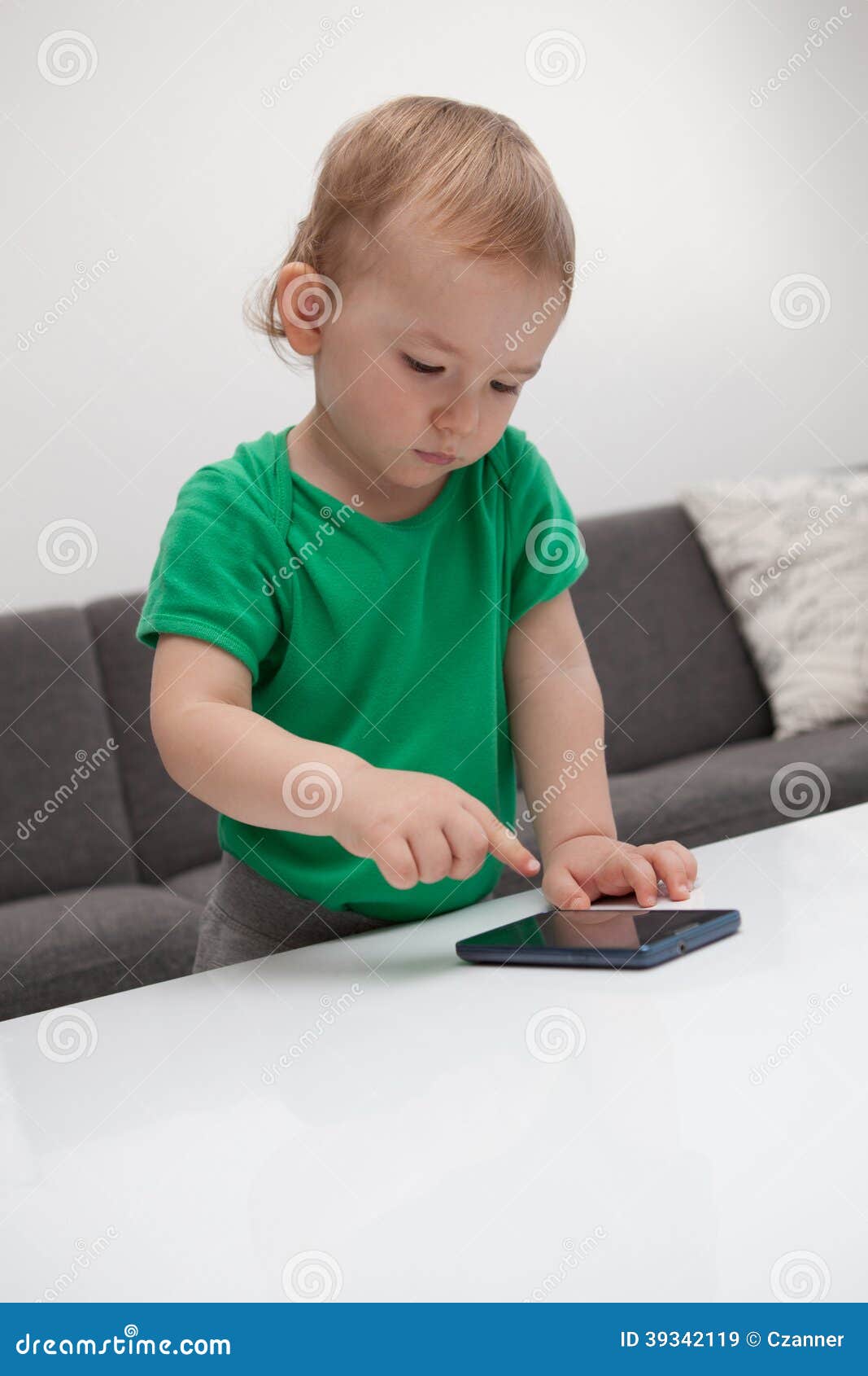 Baby with smartphone stock image. Image of cellphone - 39342119