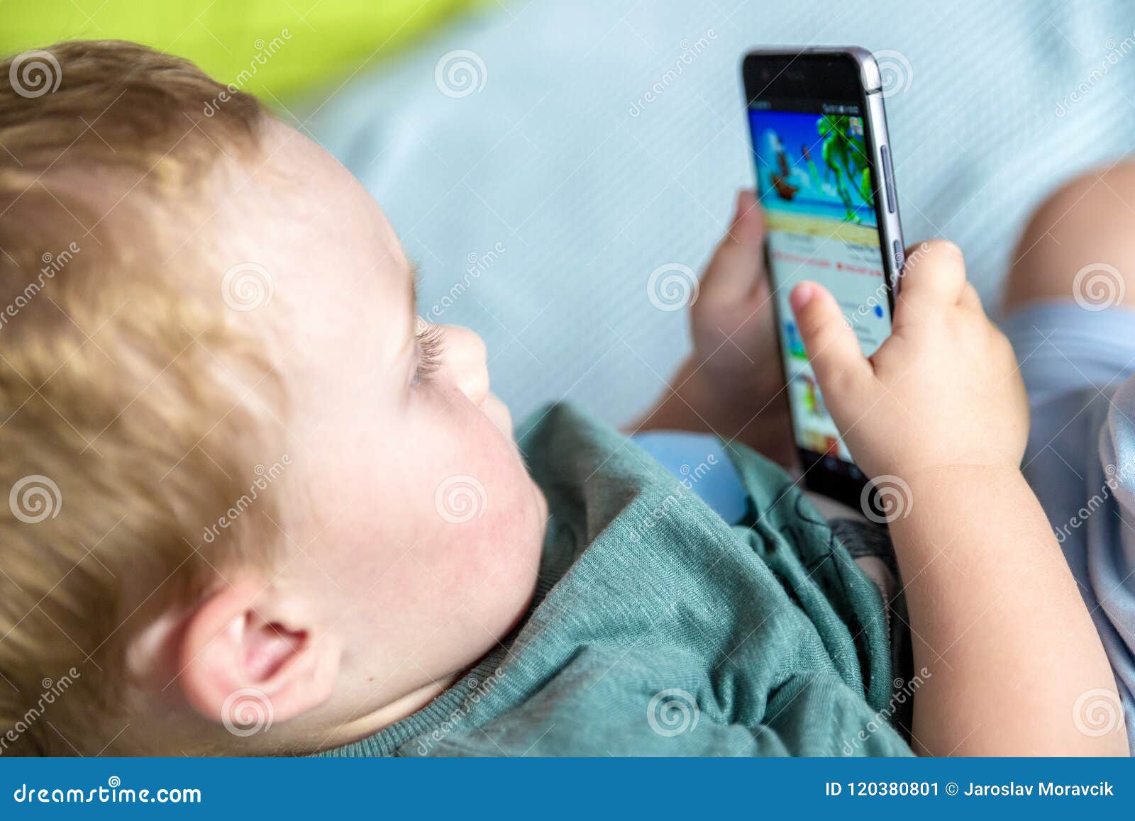 Baby with smartphone stock image. Image of technology - 120380801