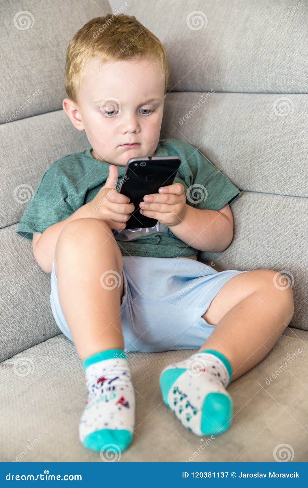 Baby with smartphone stock image. Image of young, smart - 120381137