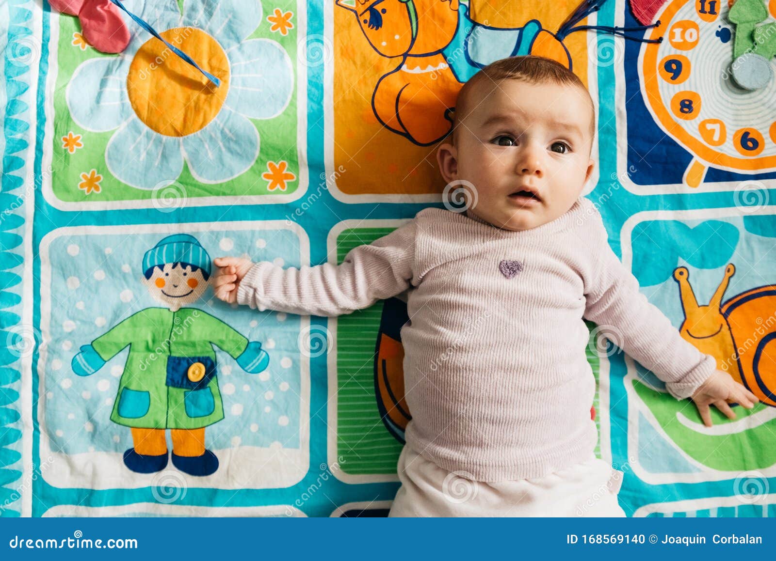 Baby Smiling with Laughter on a Mat of Early Stimulation Stock Photo ...