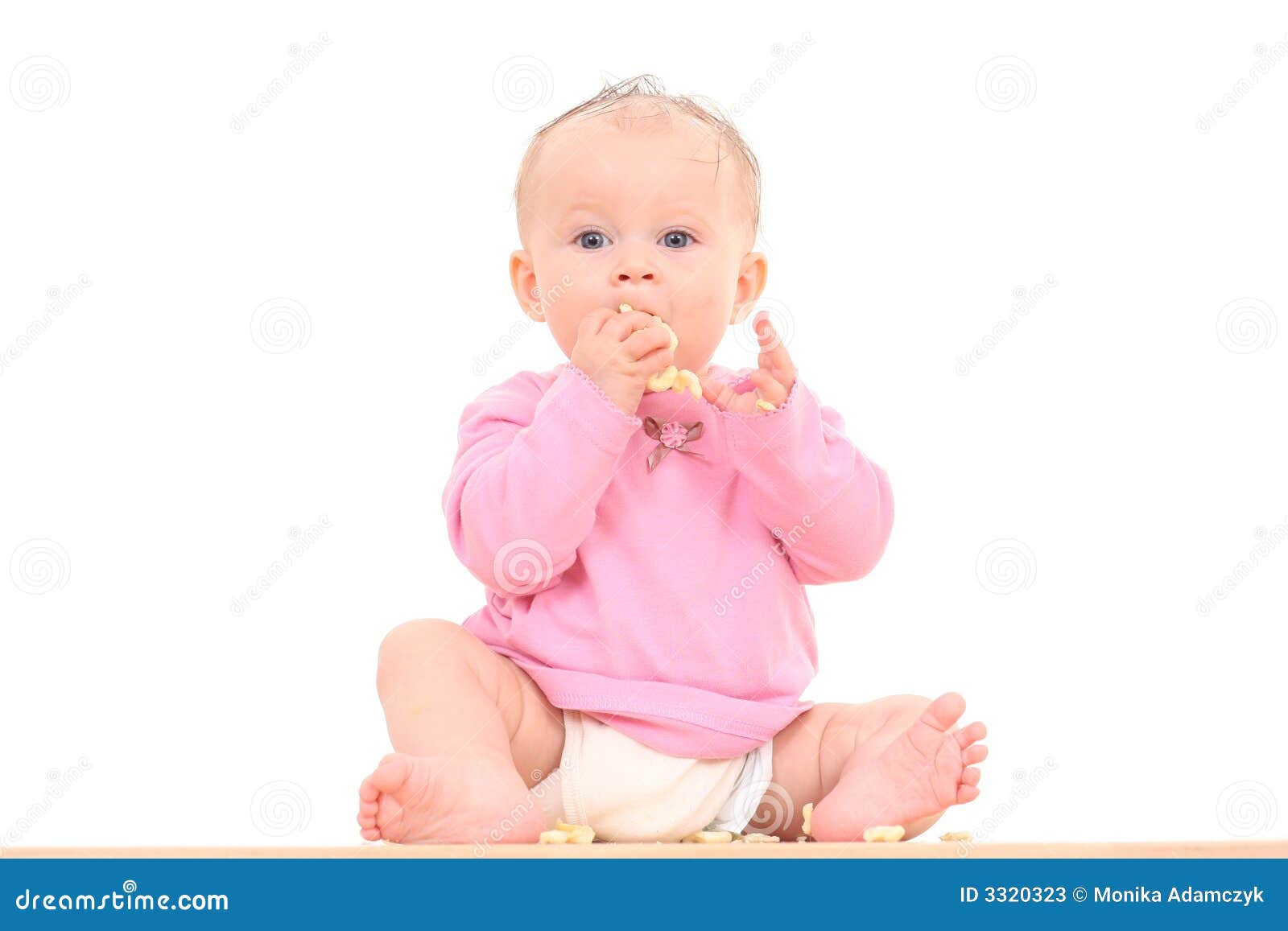 Baby and snack stock image. Image of daughter, small, expression - 3320323