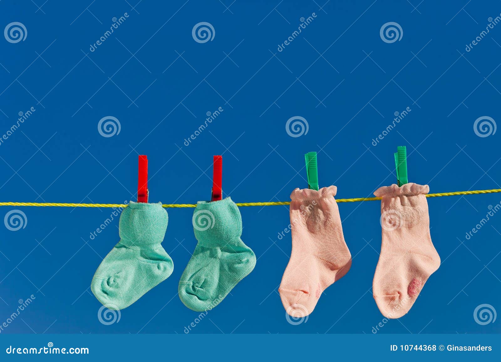 Baby Socks on Laundry Line To Dry Stock Photo - Image of clothing ...