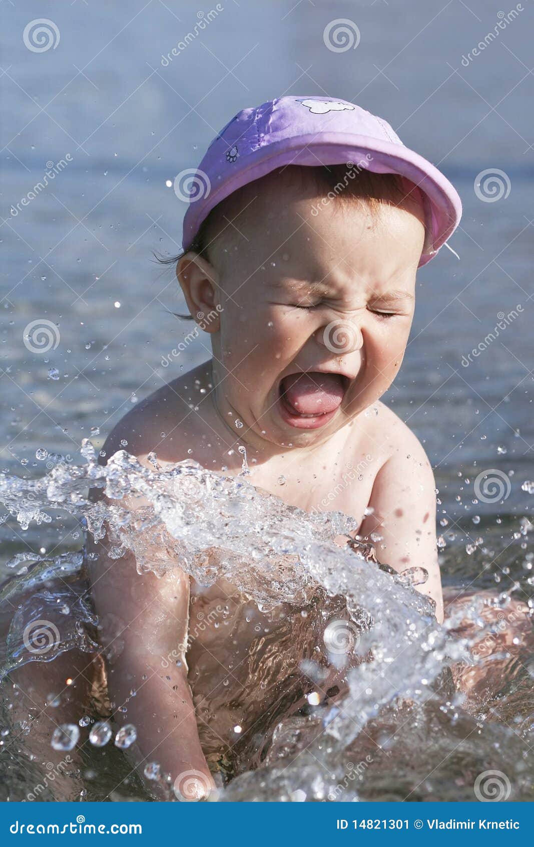 Baby splashing in water stock image. Image of splashes - 14821301