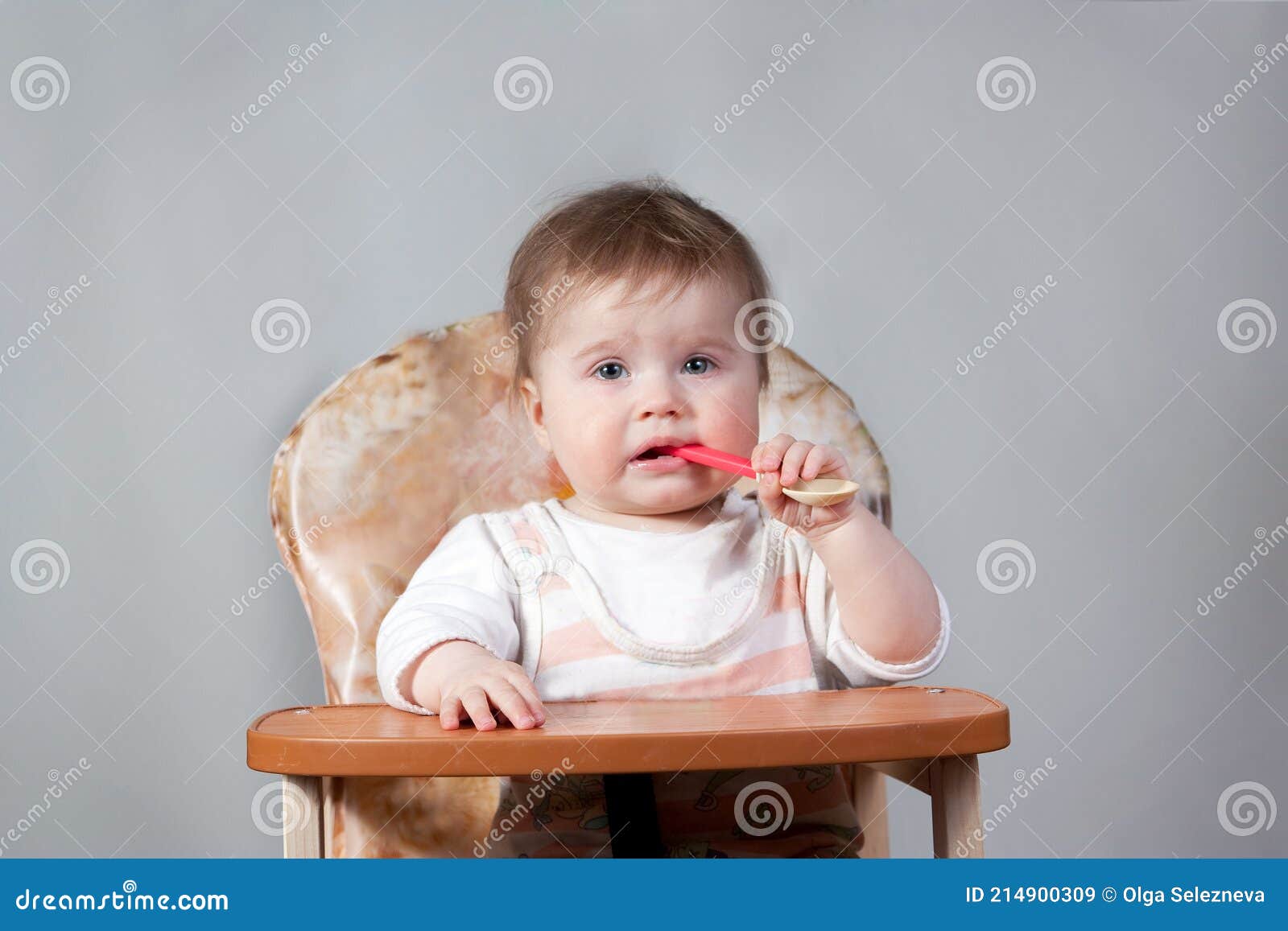 Baby with spoon stock image. Image of adorable, baby - 214900309