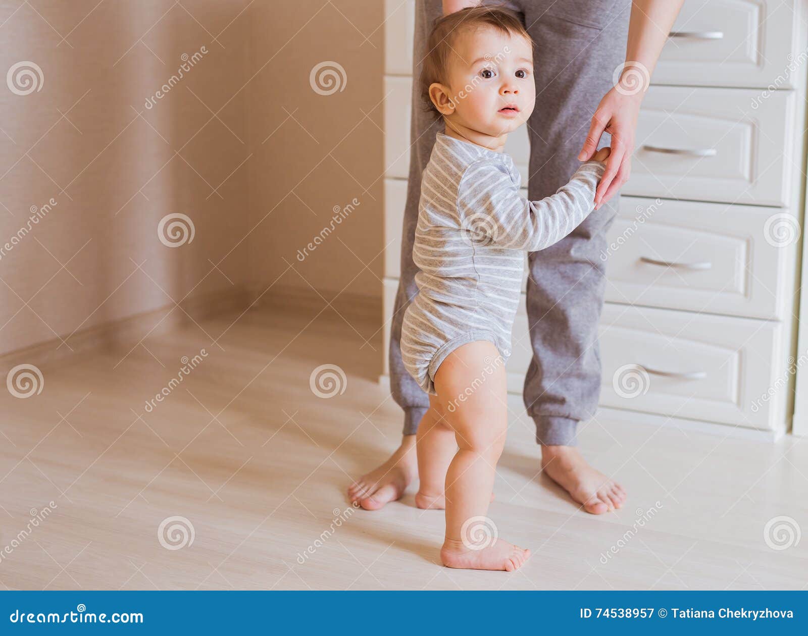 Baby Steps with the Help of His Mother Stock Image - Image of happy ...