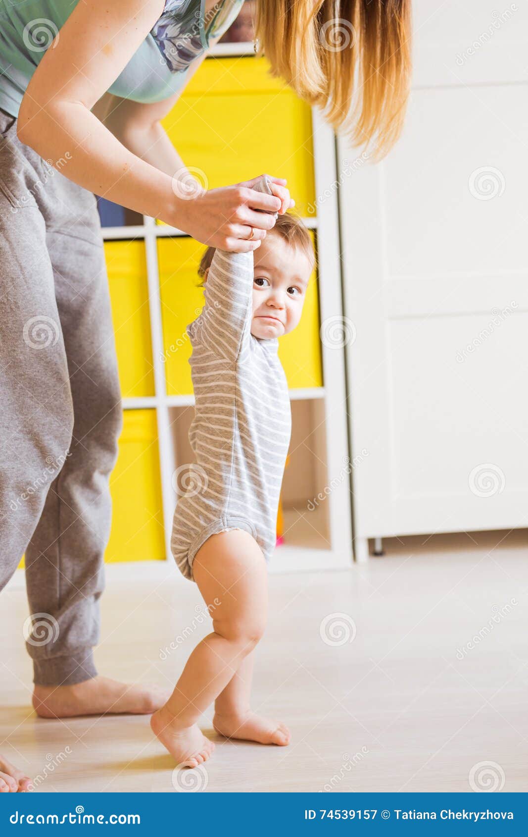 Baby Steps with the Help of His Mother Stock Image - Image of parenting ...