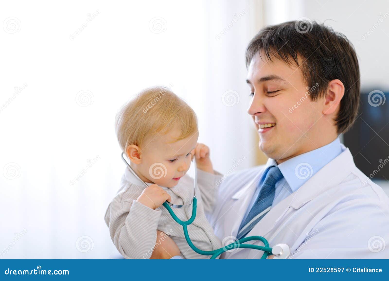 Baby with Stethoscope on Hands of Pediatrician Stock Image - Image of ...