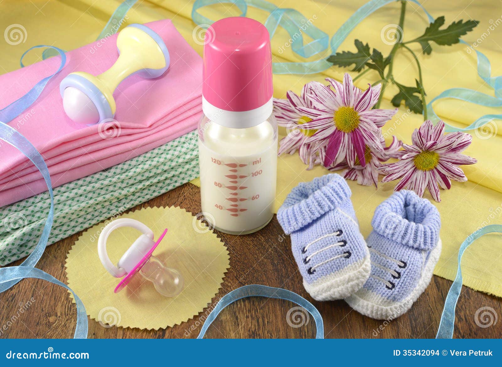Baby Still Life with Blue Boots and Milk Bottle Stock Photo - Image of ...