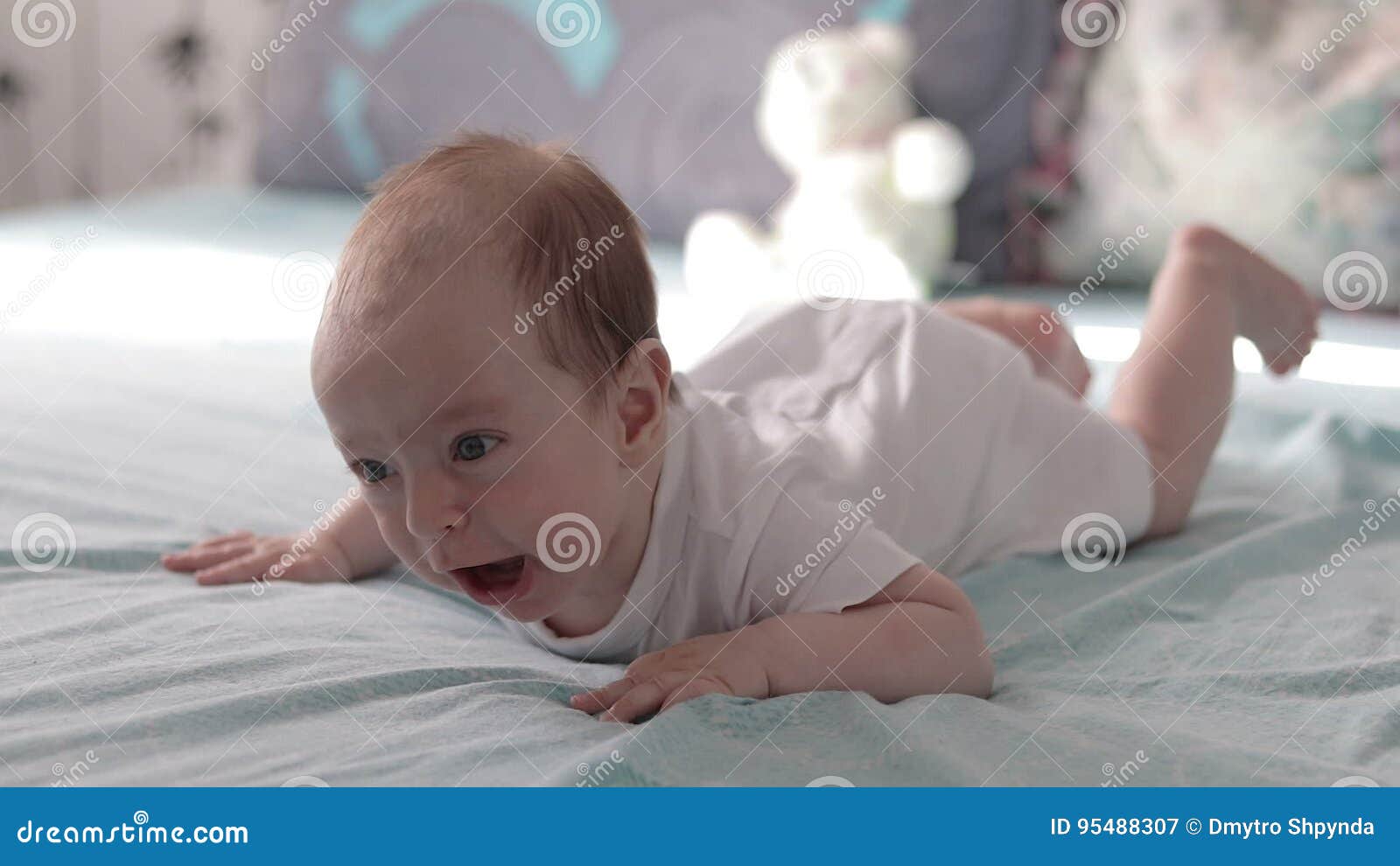 Baby on Stomach and Crying. Dolly Shot Stock Video - Video of daughter ...