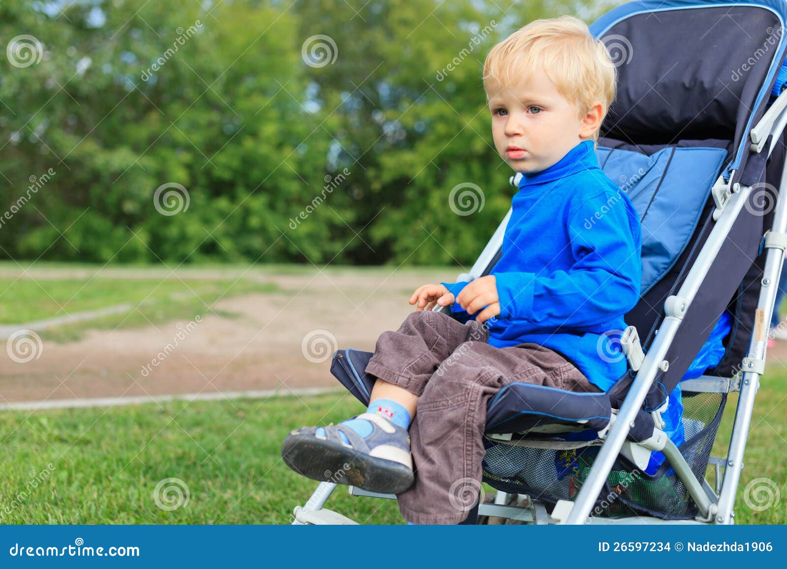 Baby in stroller stock photo. Image of family, person - 26597234