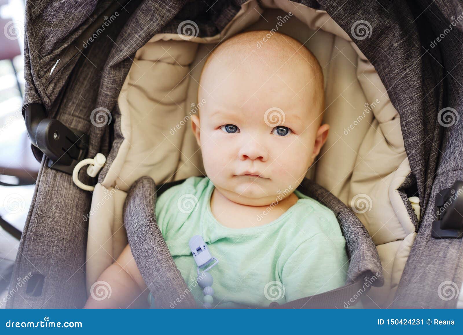 Baby in stroller stock image. Image of family, people - 150424231